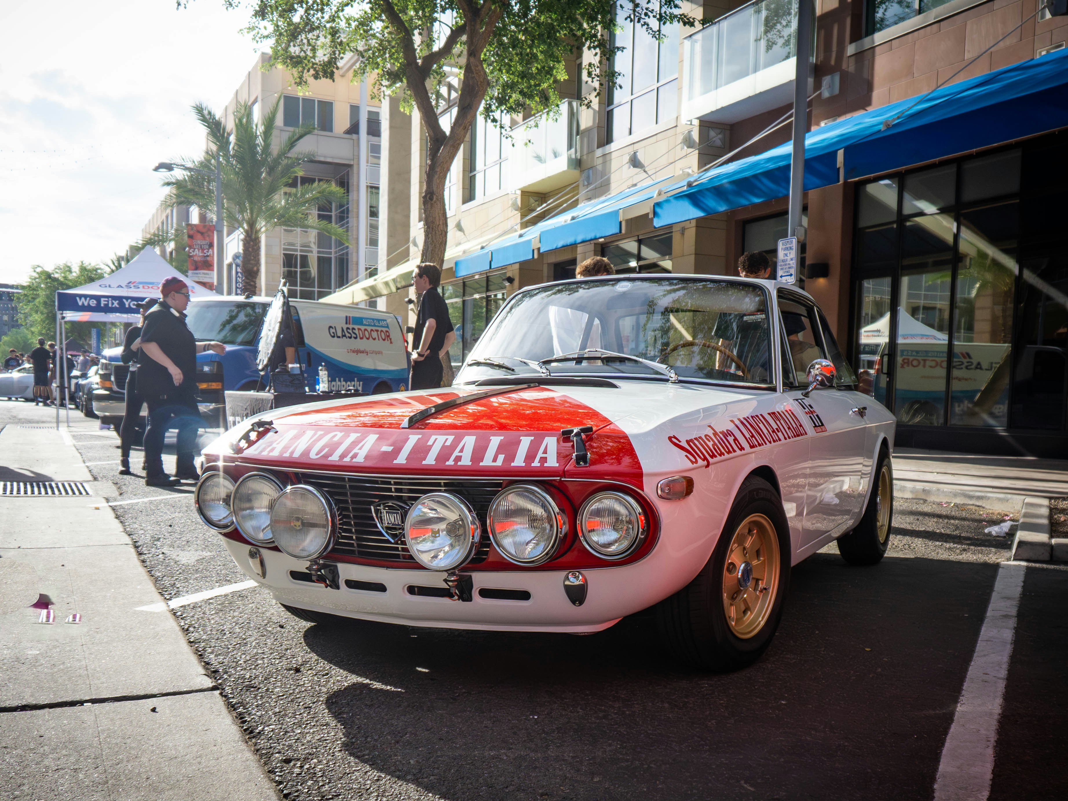 Italian Racing Red on the Sunlit Street