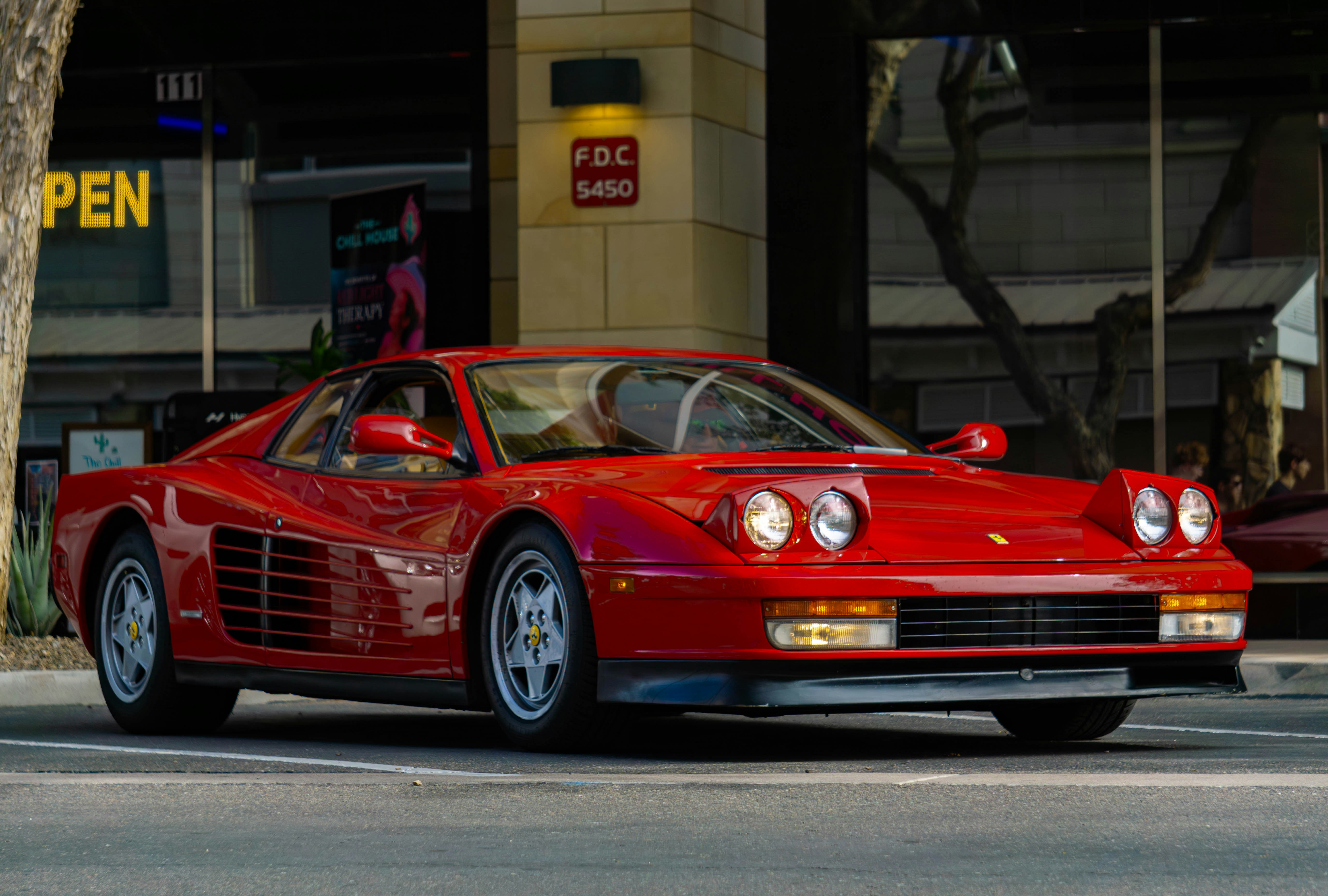 Ferrari Red: The Street-Ready Icon Rests Under Neon City Light