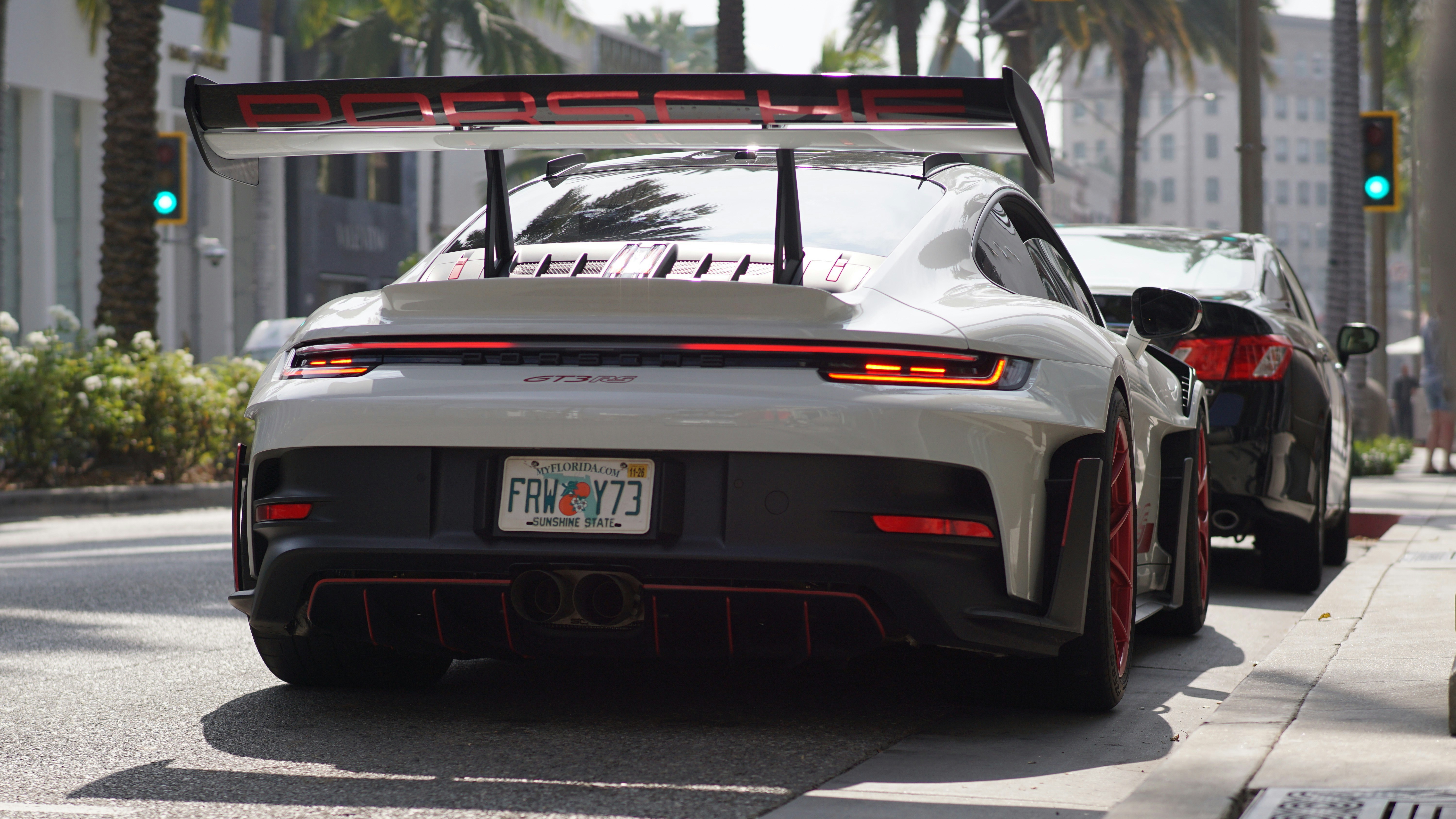 Rear-Engine Thunder: A White Porsche GT3 RS Parked at Sunset-Soft Street