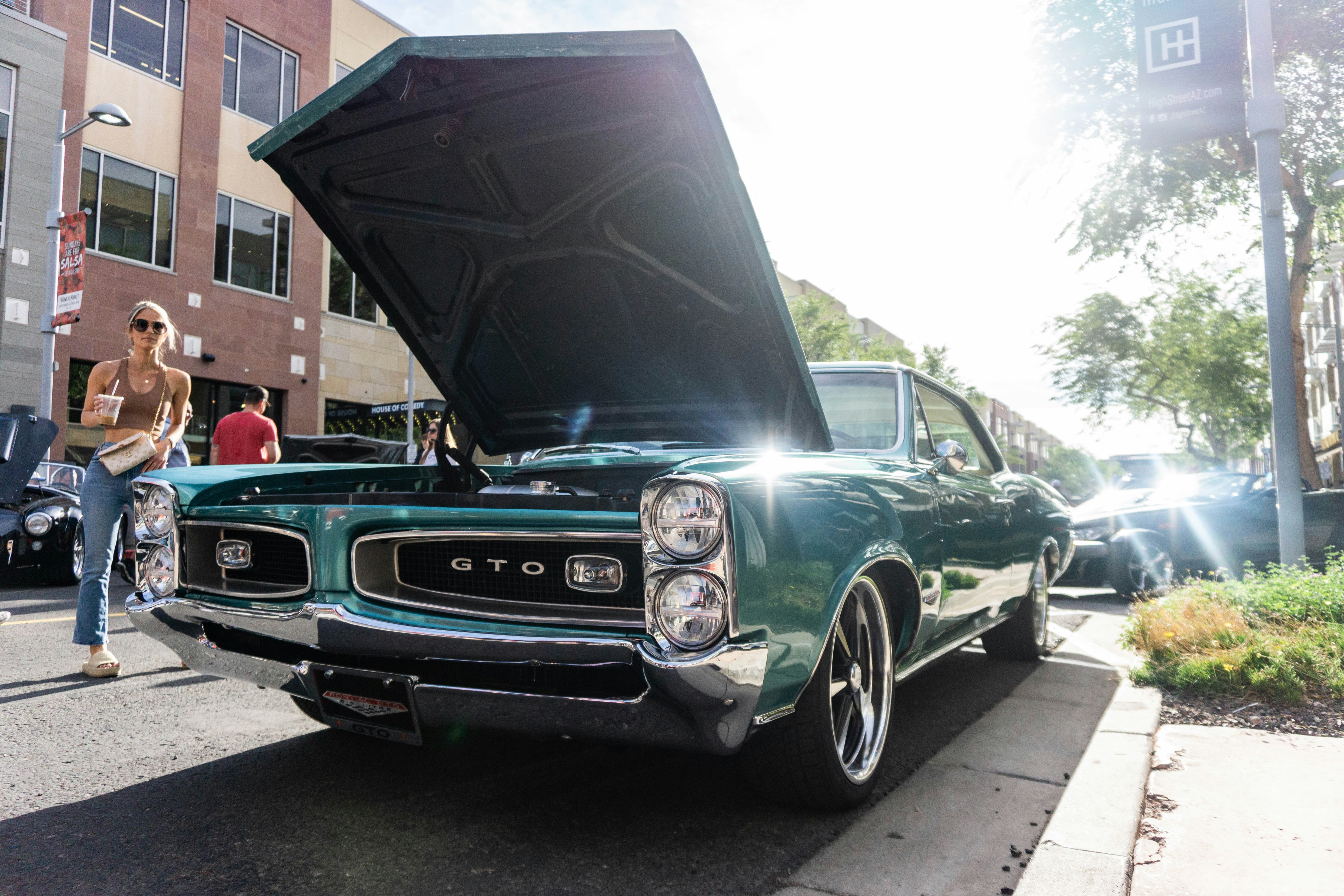 Open Hood, Classic Chrome: A Green Pontiac Stages/Toward the Street Show