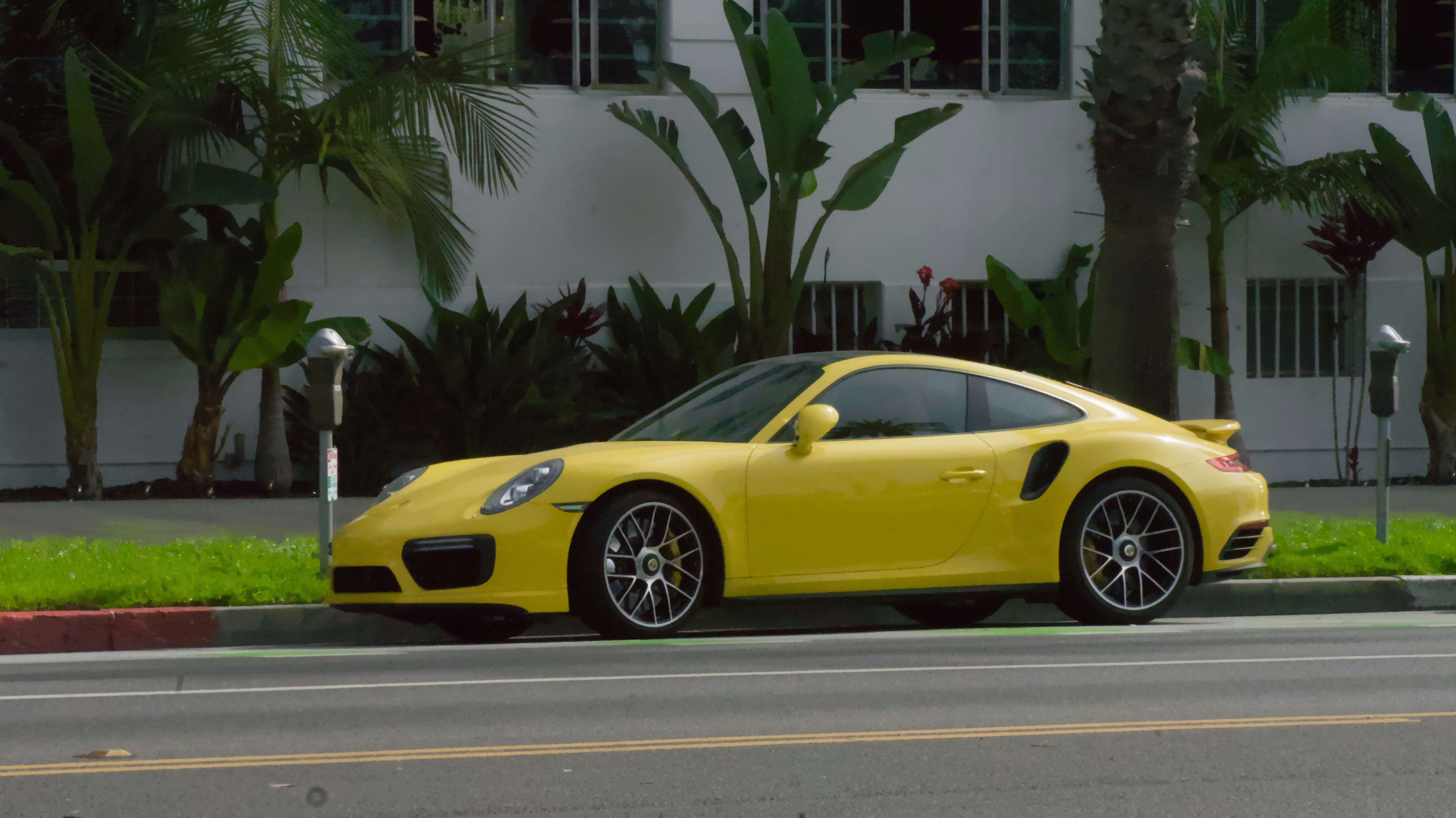 Golden Coupe on Quiet Street: Precision in Yellow