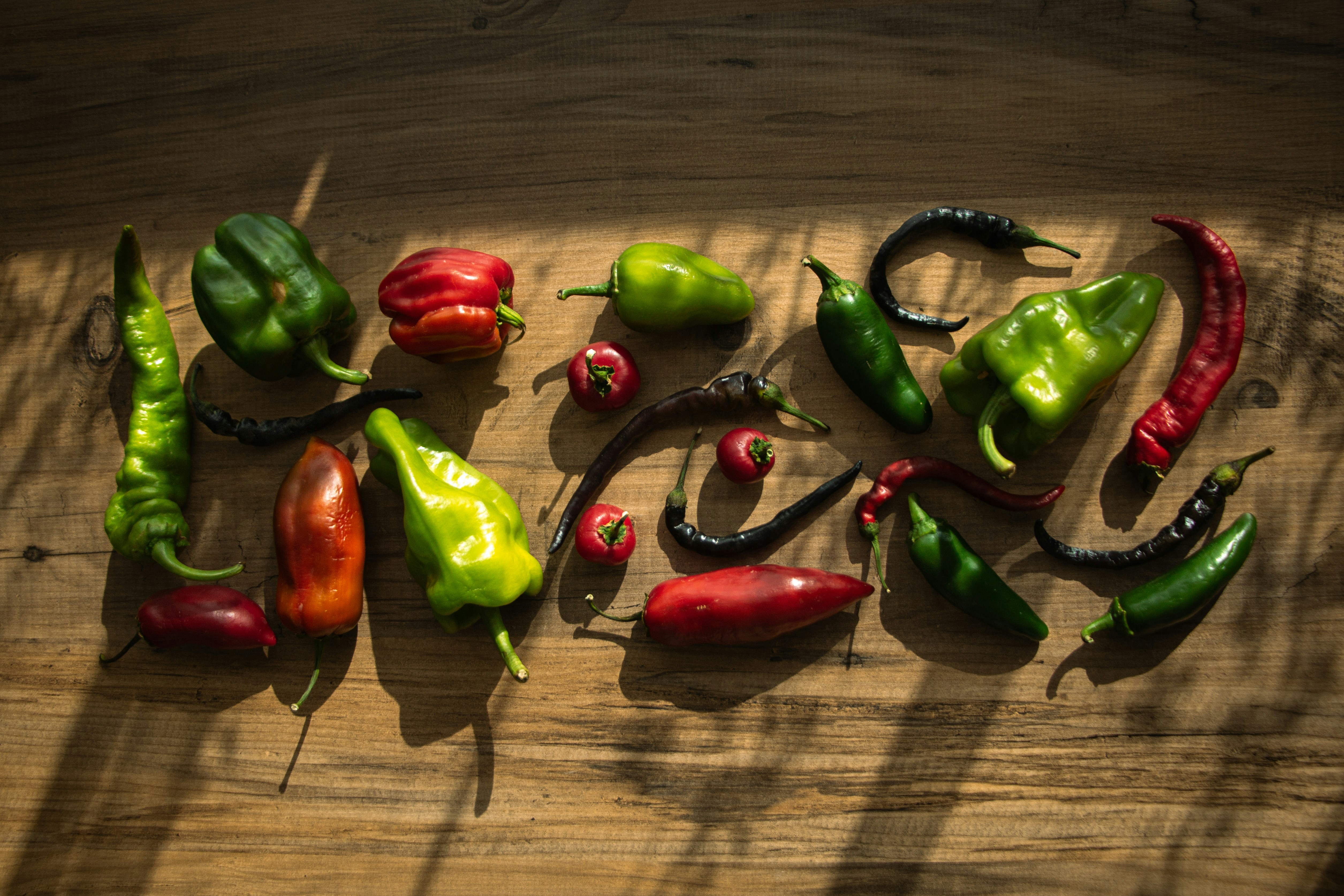 Sunlit Pepper Parade on a Rustic Table