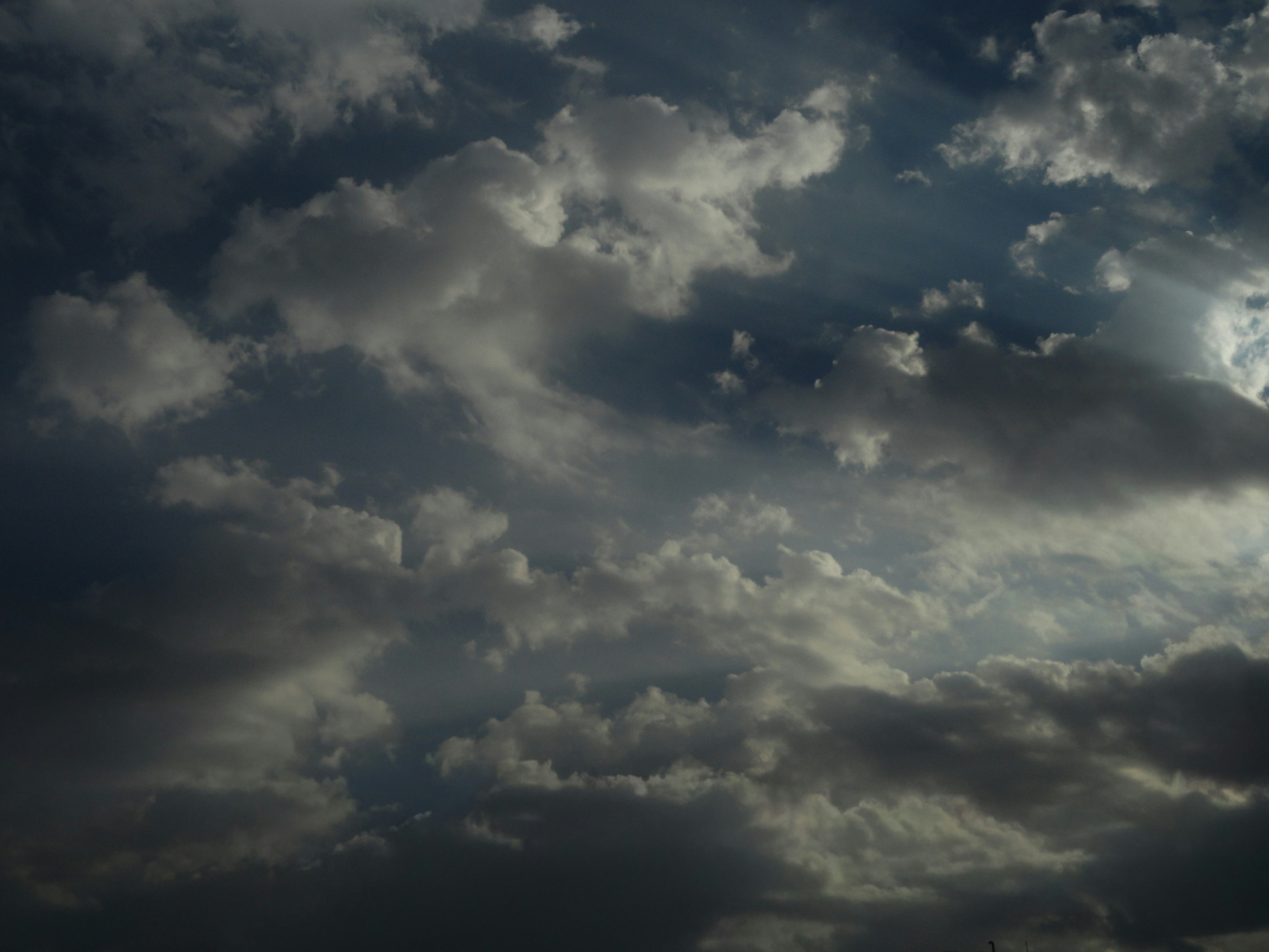 Drifting Cloudscapes: A Quiet Break in the Sky