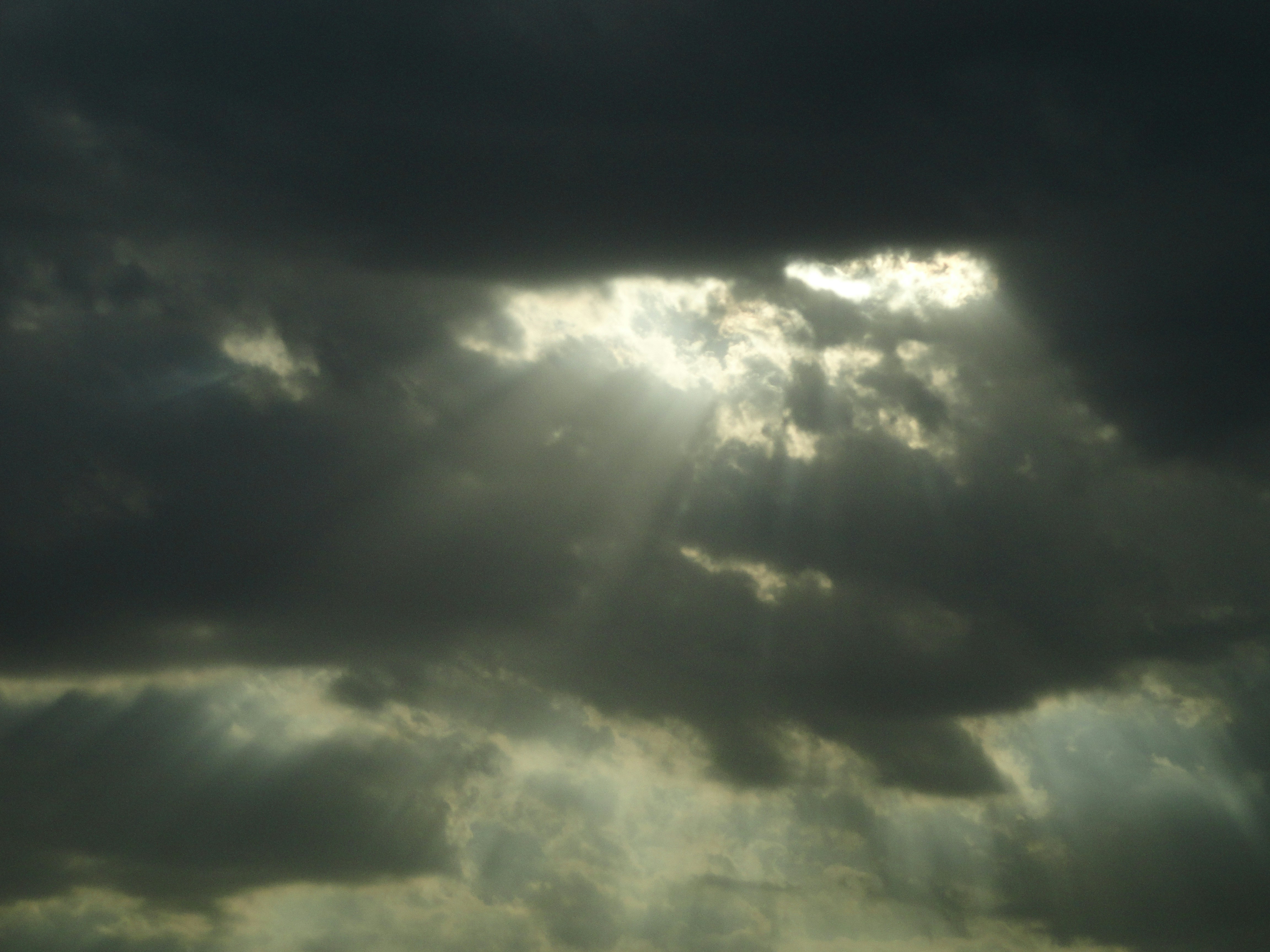 Sunbeams Through a Tear in the Sky