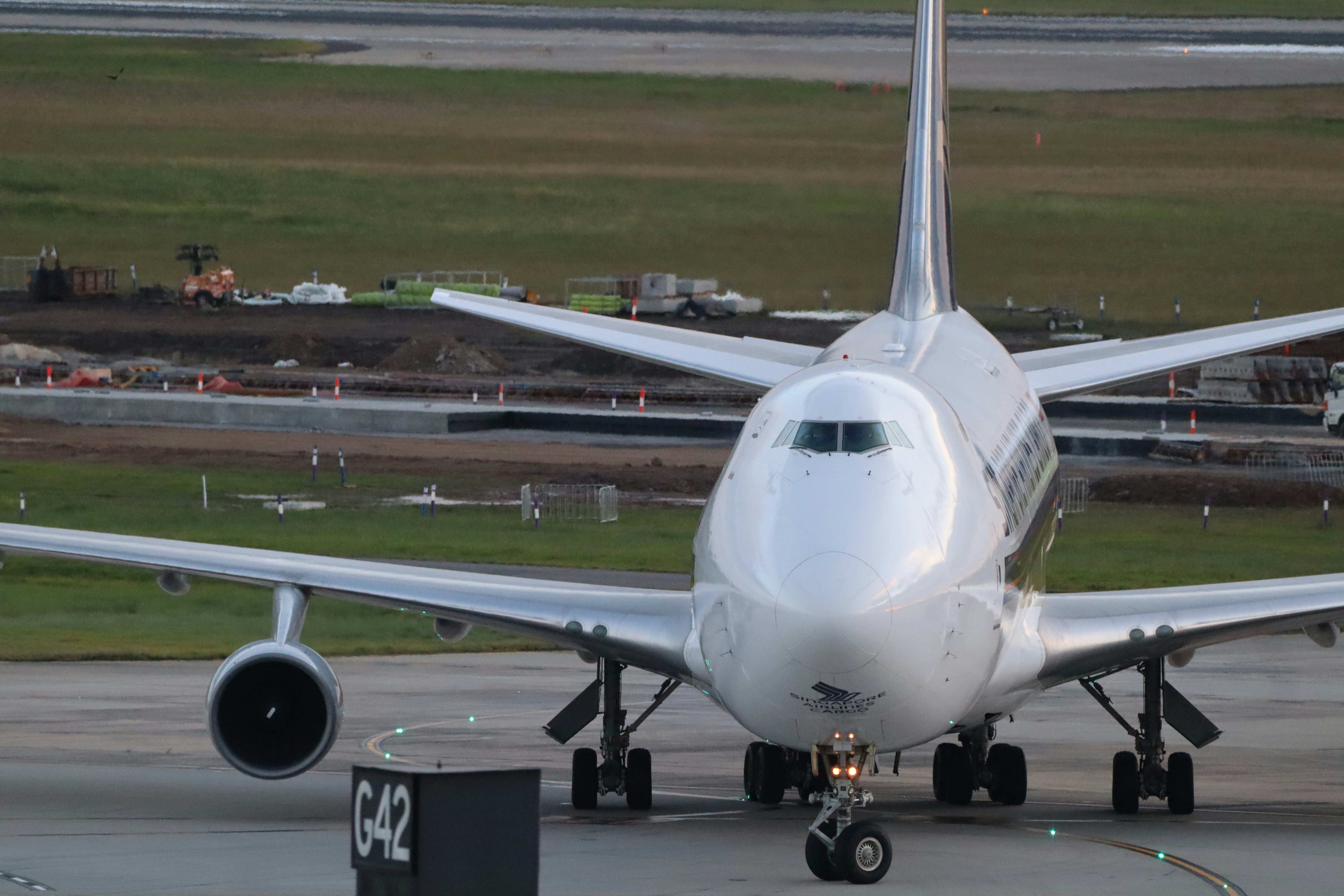 Front-on Jet at the Gate: Symmetry and Power in White