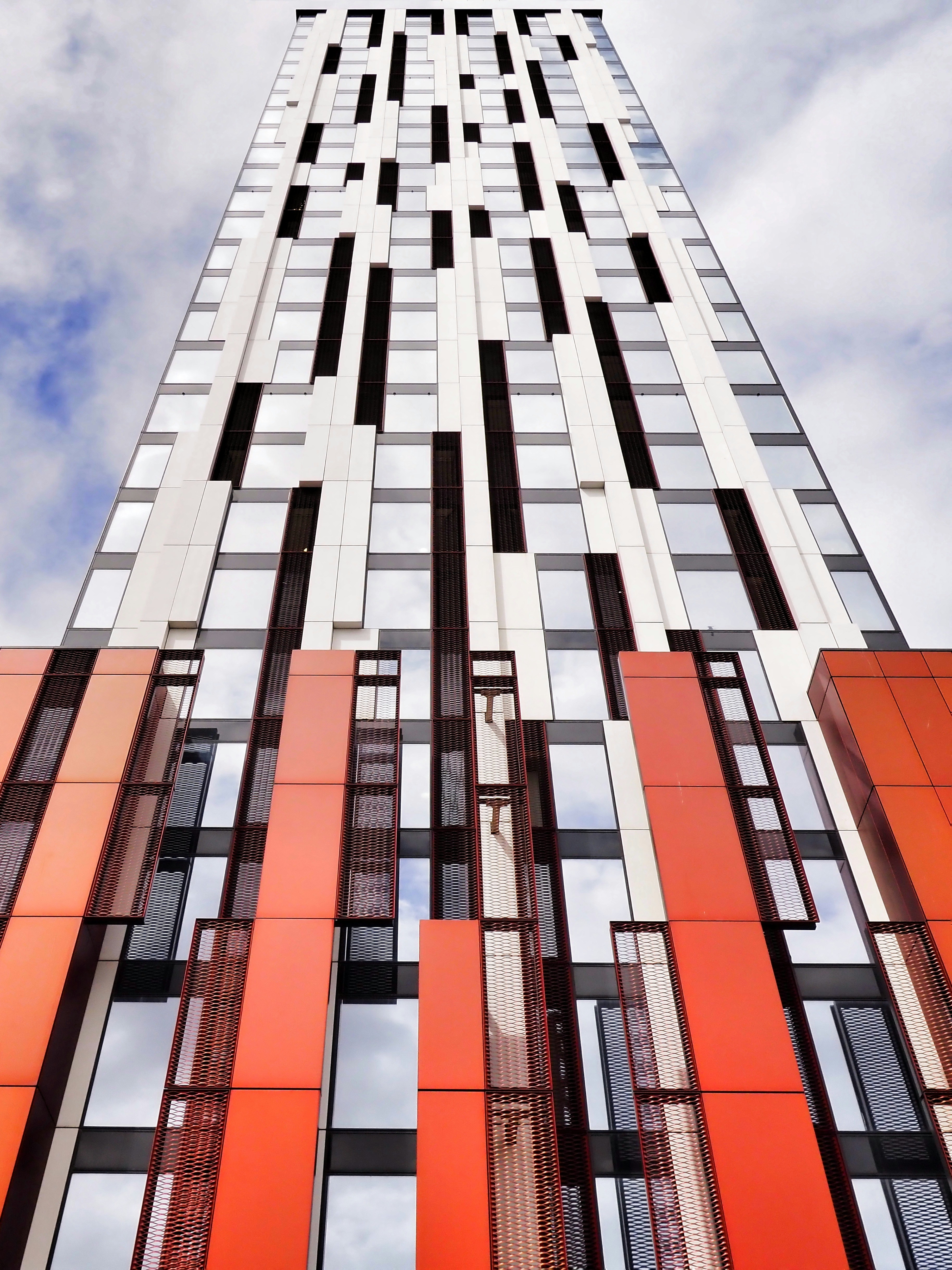 Vertical Prism: A Modern Facade Reaching for the Sky