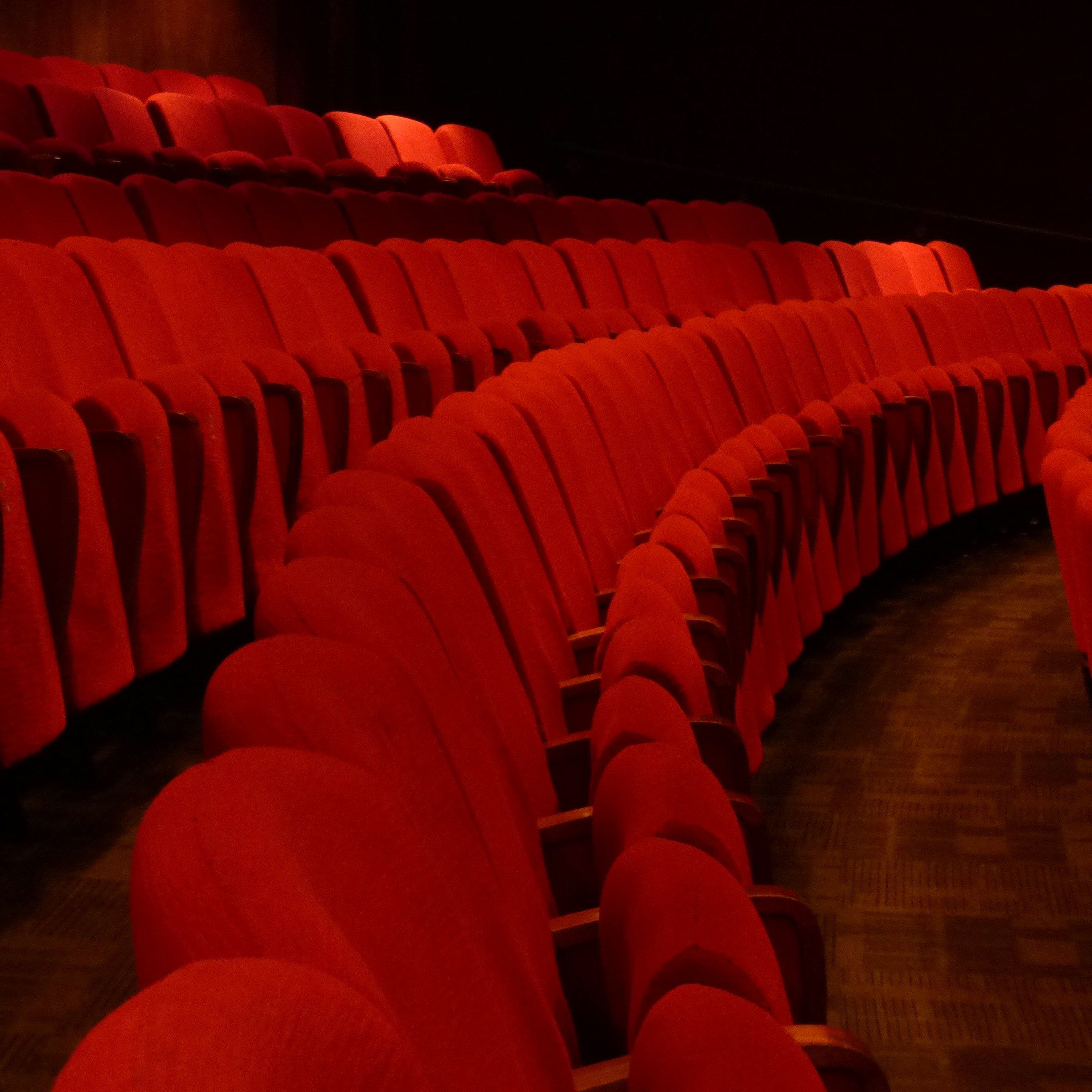 Red Velvet Rows: An Immersive Moment in a Quiet Theater