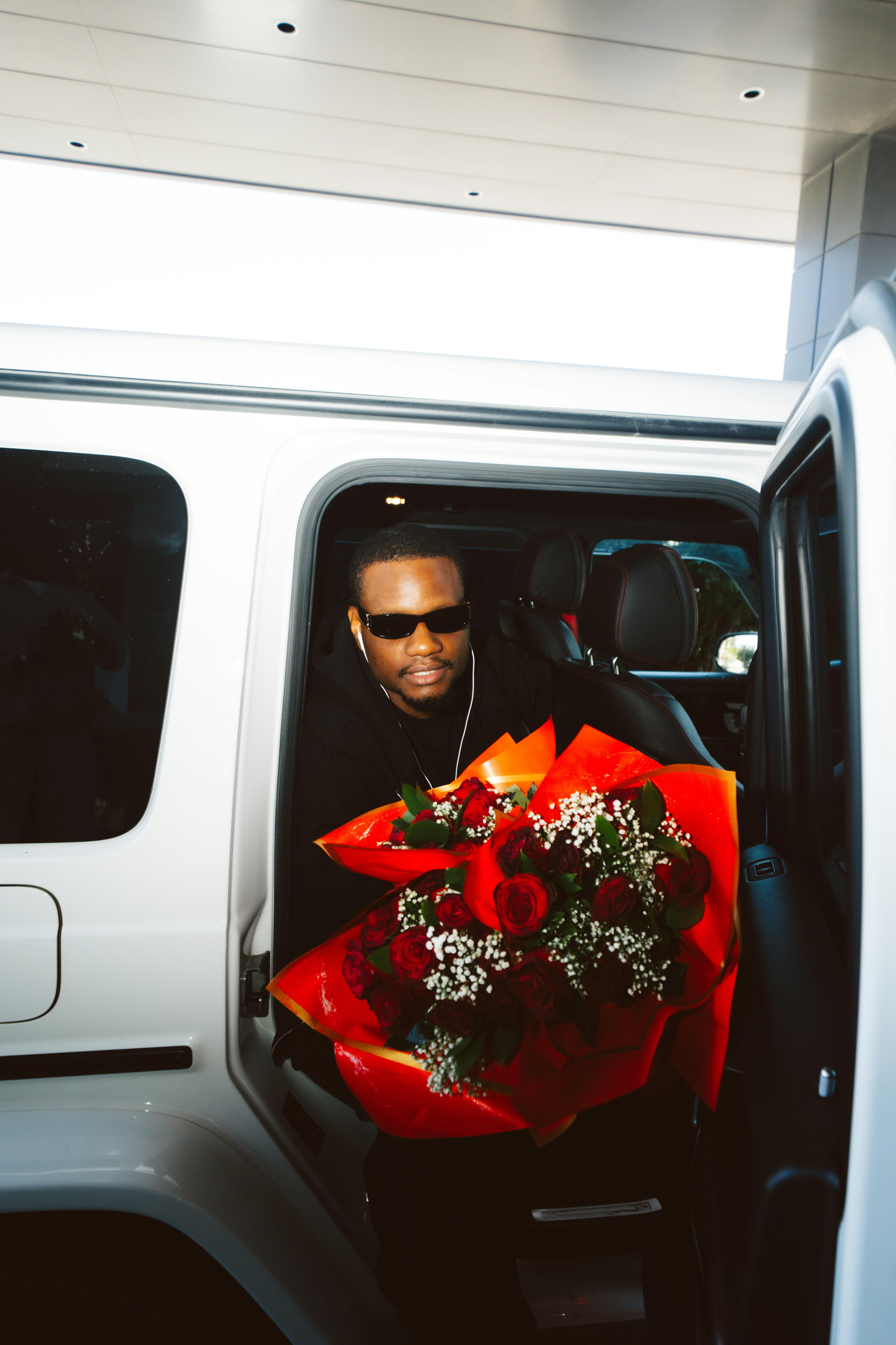 Bouquet Composure: A Quiet Entrance from the Van