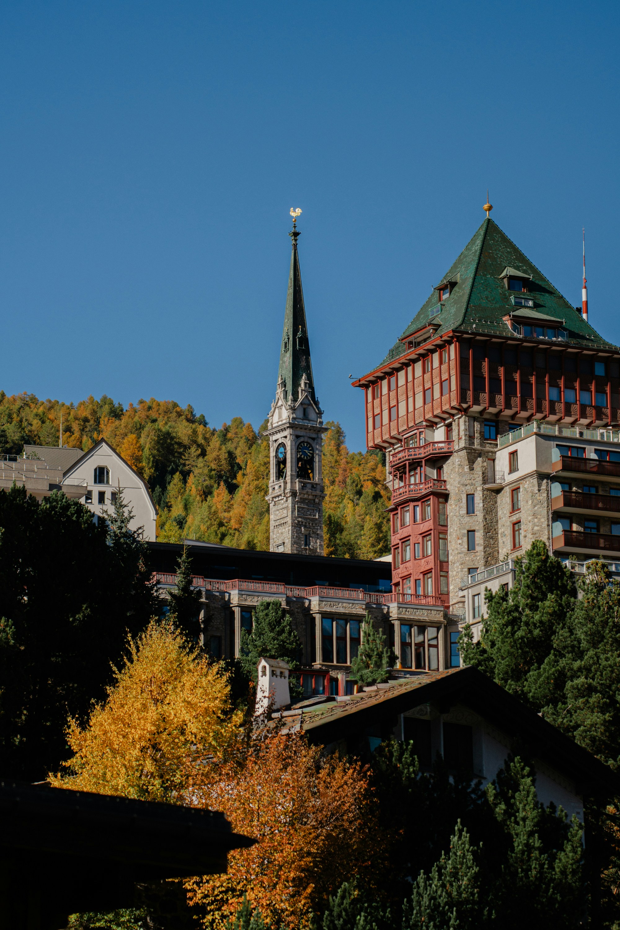 Spired Clock Tower Amid Autumned Townscape