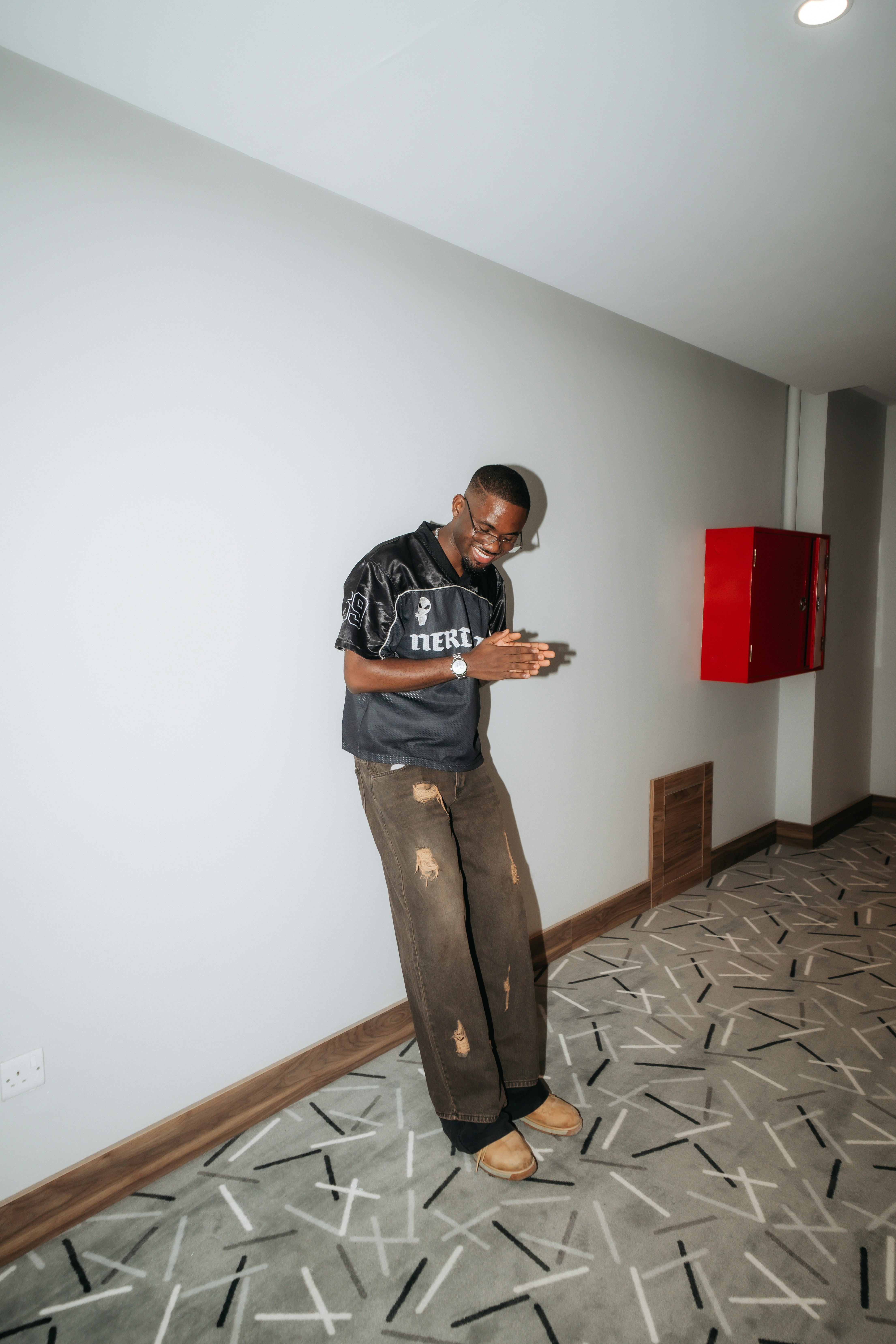 Casual Grounded Moment: Streetwear and Self-Contained Focus