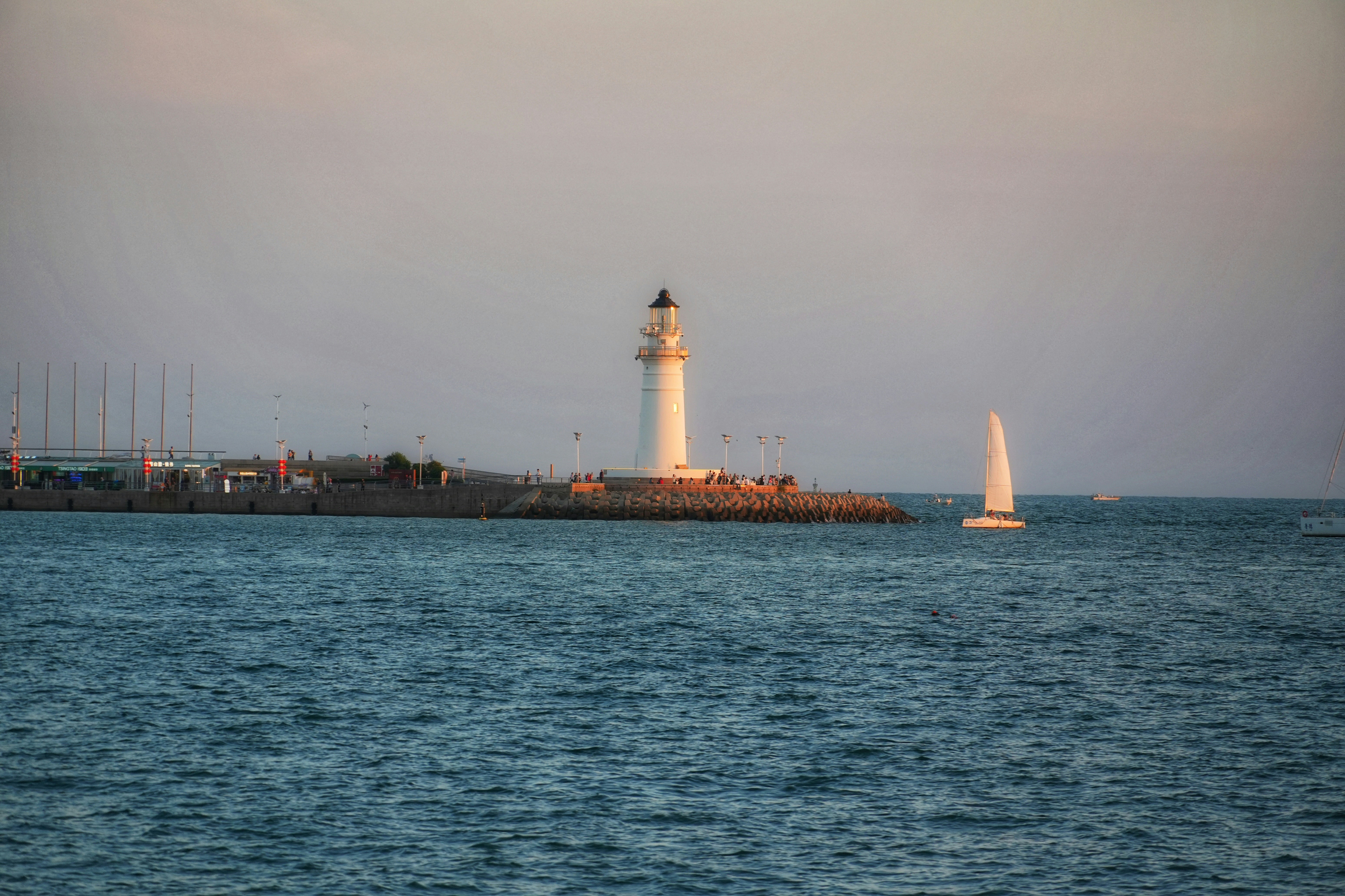 Lighthouse Sentinel and Sailed Solitude