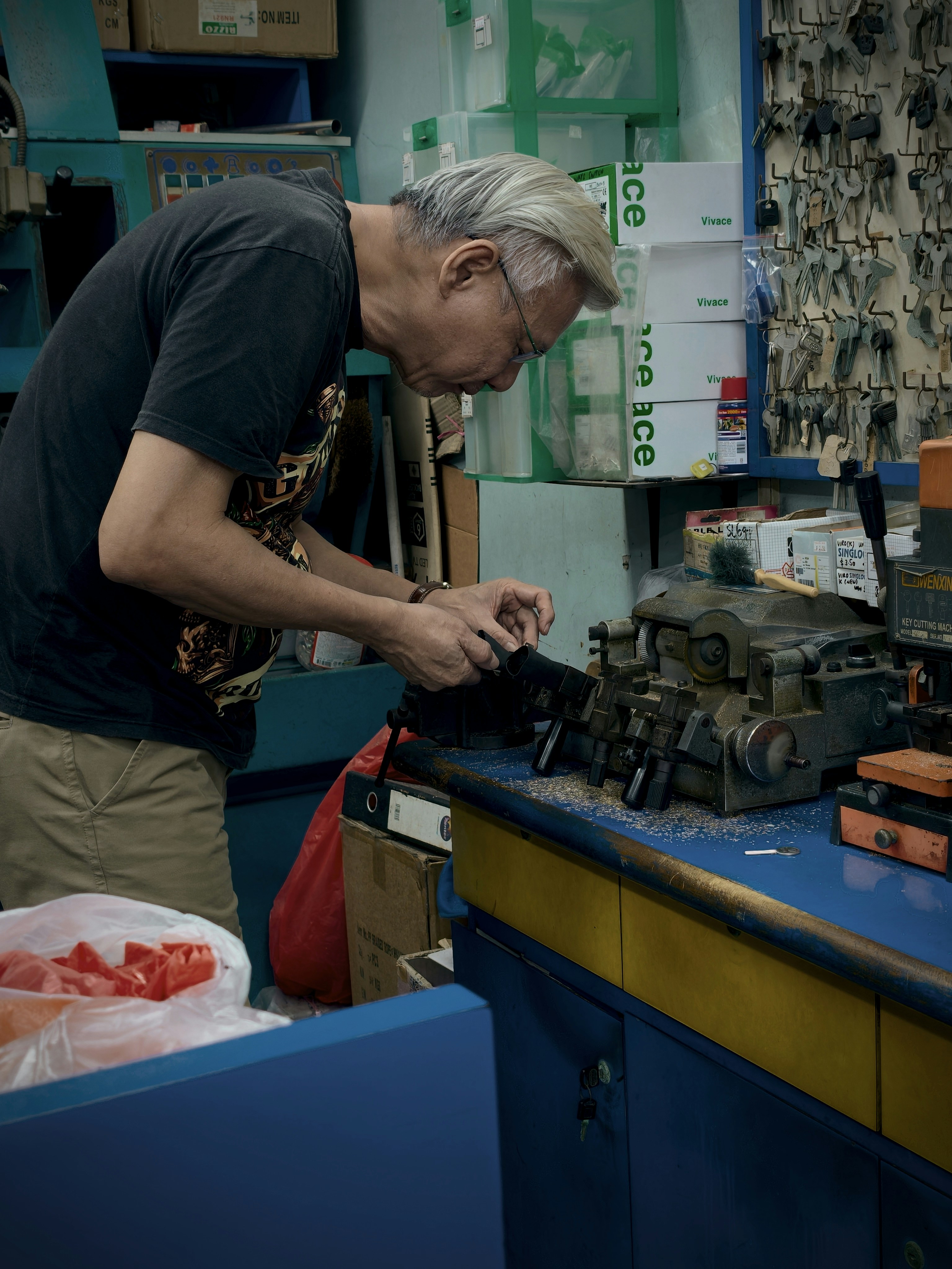 Skilled hand at work: metal shavings fly as a craftsman sharpens precision