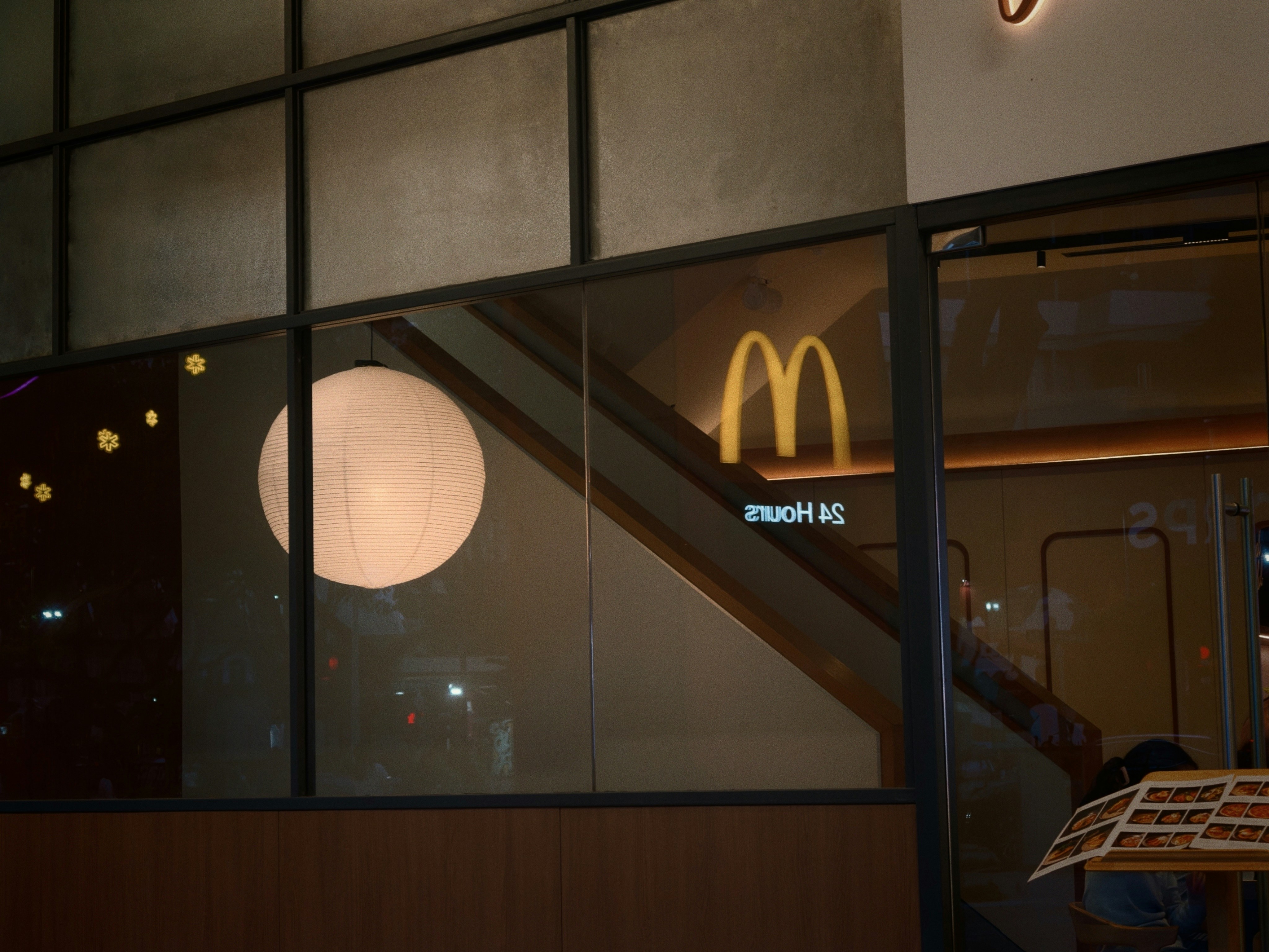 Neon Golden Arches Reflected in Studio Glass