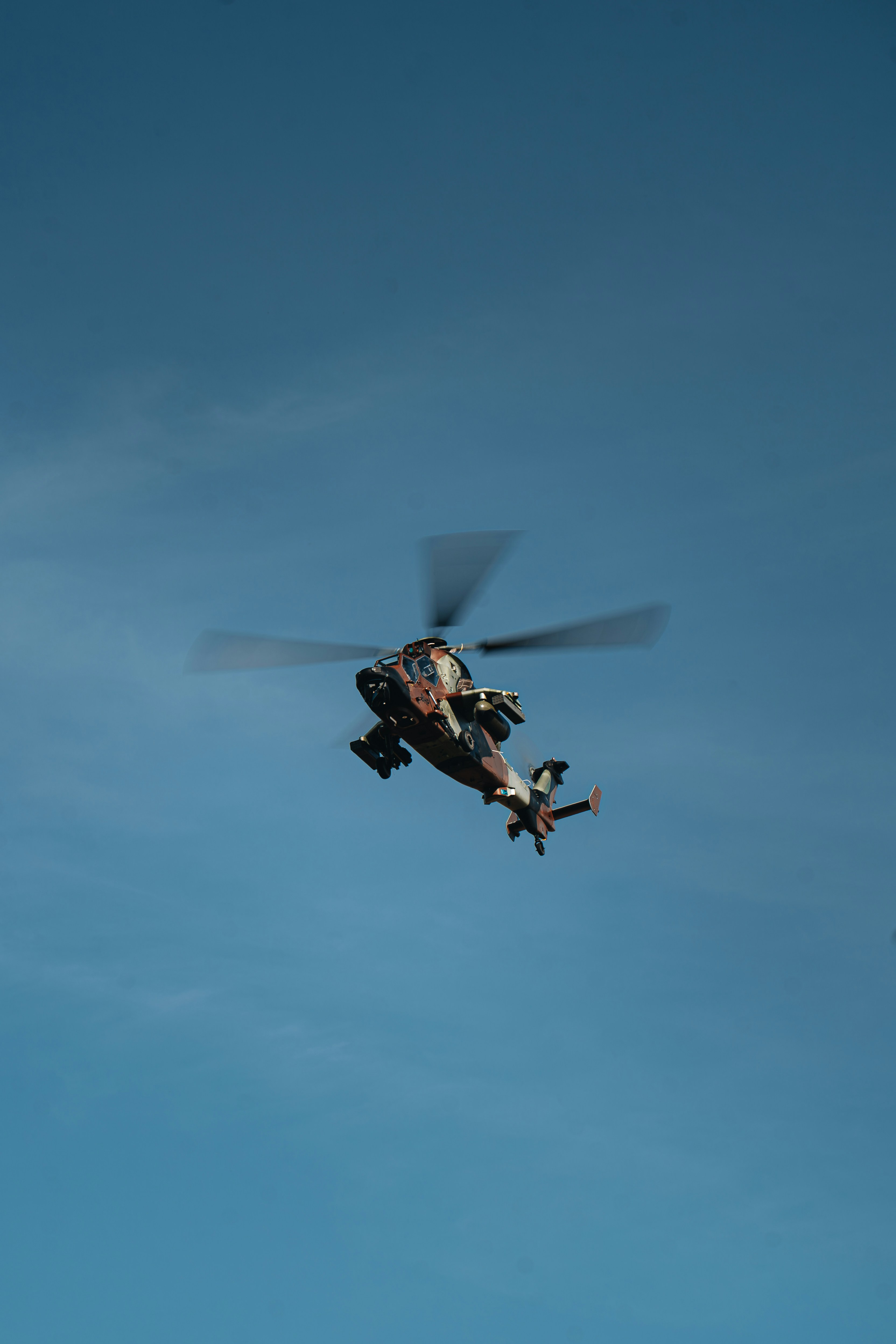 Aerial Venture: Helicopter in Clear Blue