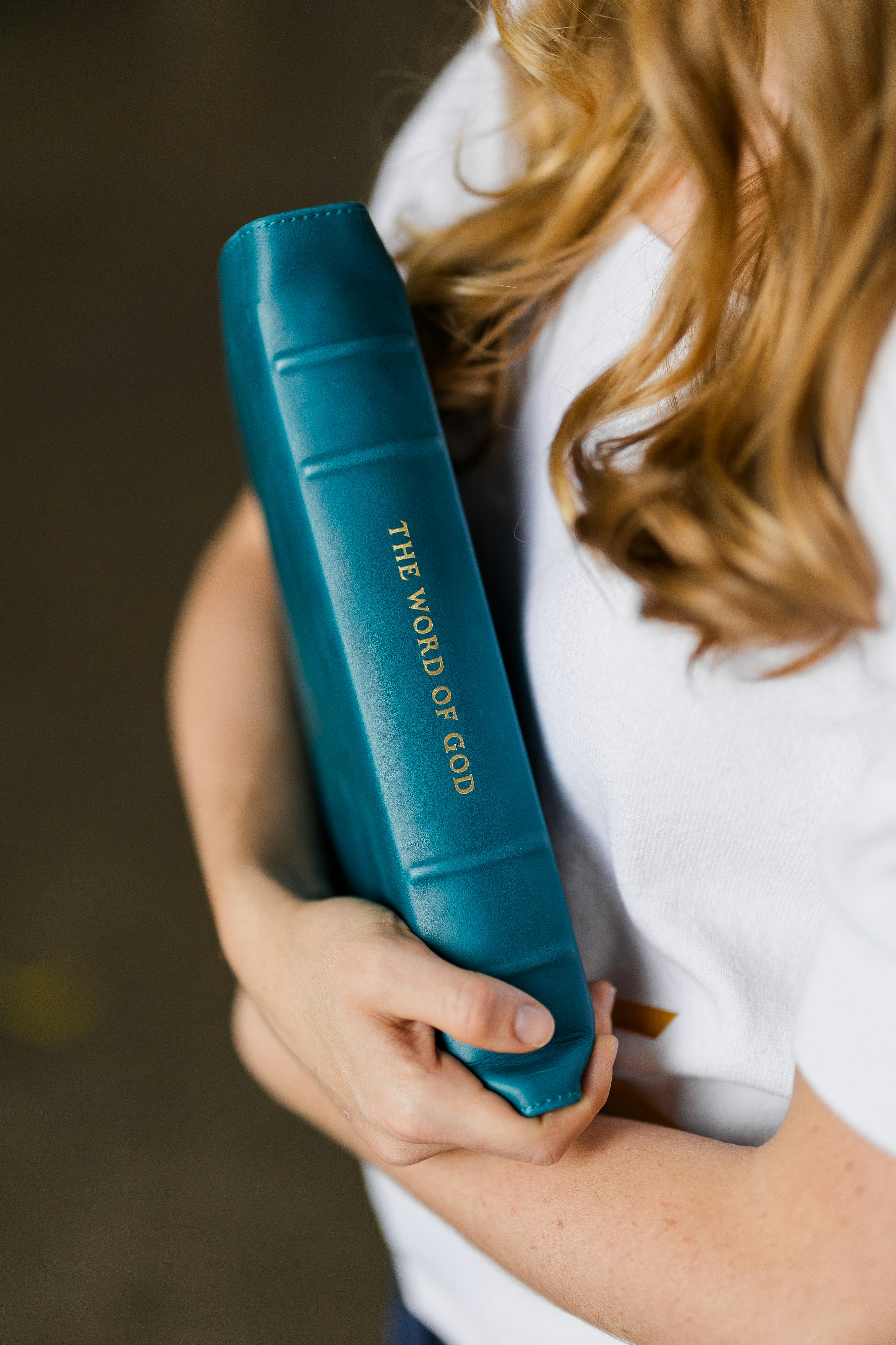 Teal Bible, Warm Hair, Quiet Grasp