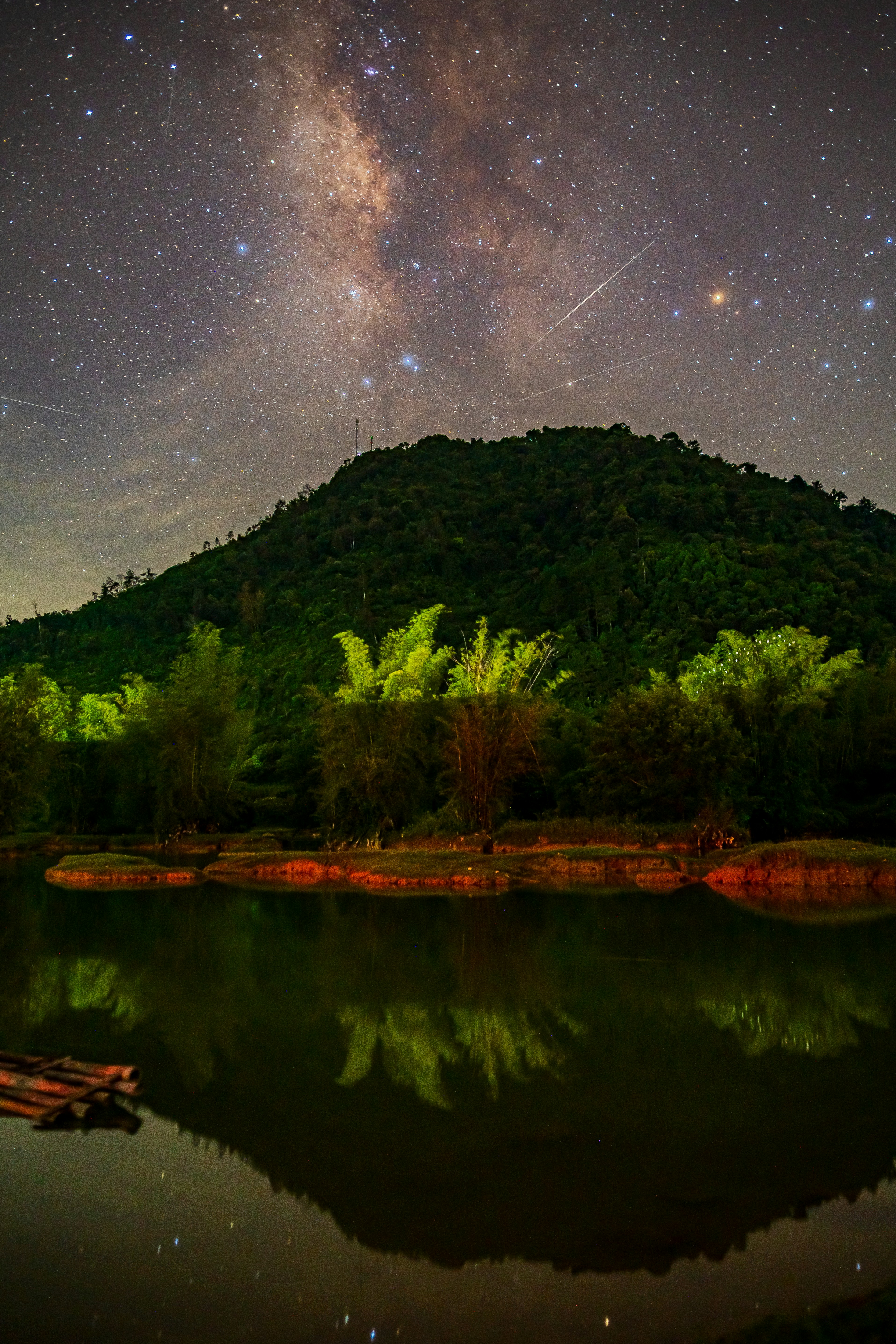 Milky Way Over the Quiet Hill and Lake