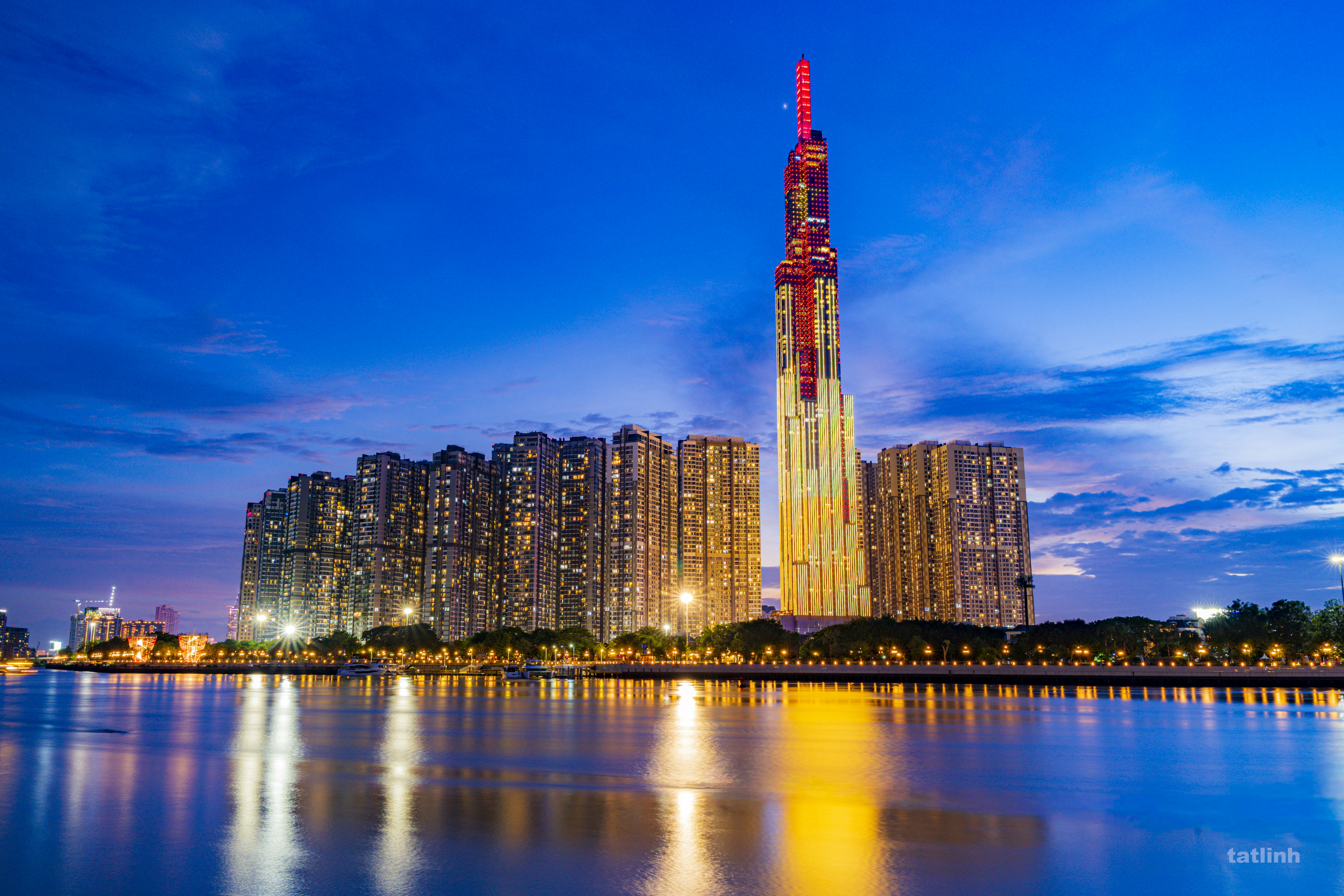 Twin-Tower Lightscape: City Edge Reflects on the River