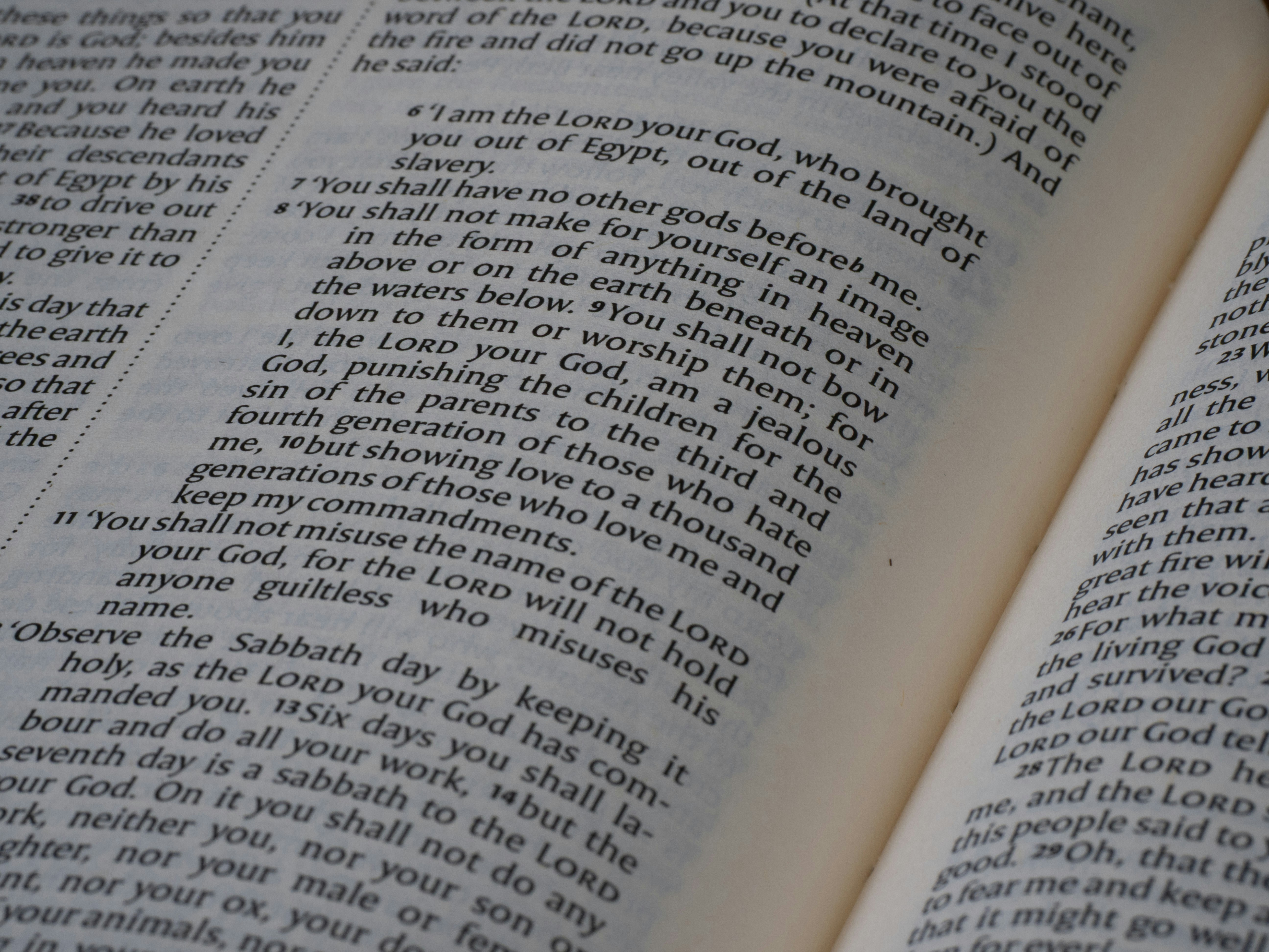 Close-Quarters Scripture: A Folded Page Illuminates a Quiet Reading Moment
