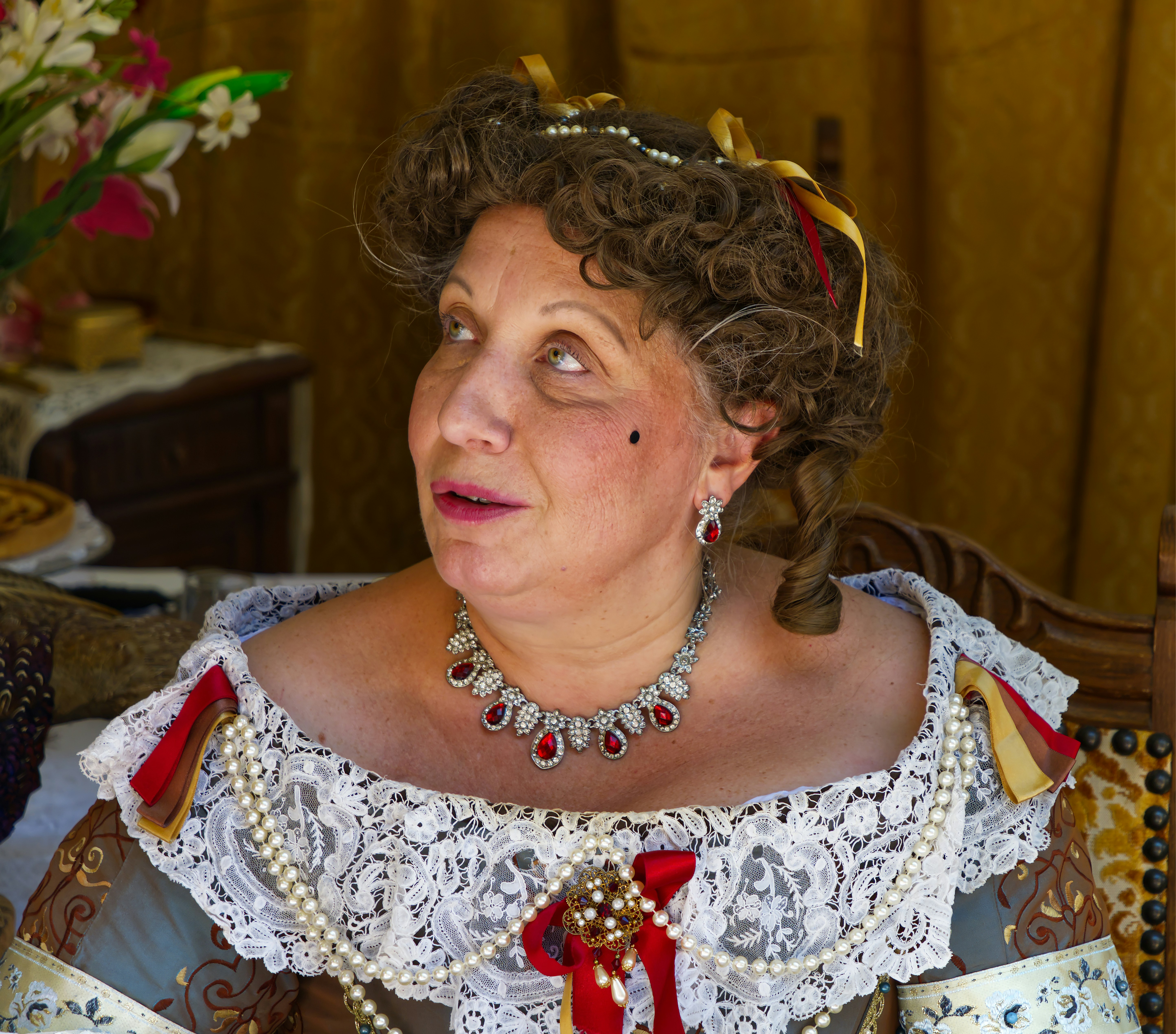 Queenly Gaze: Vintage Attire in a Golden Salon