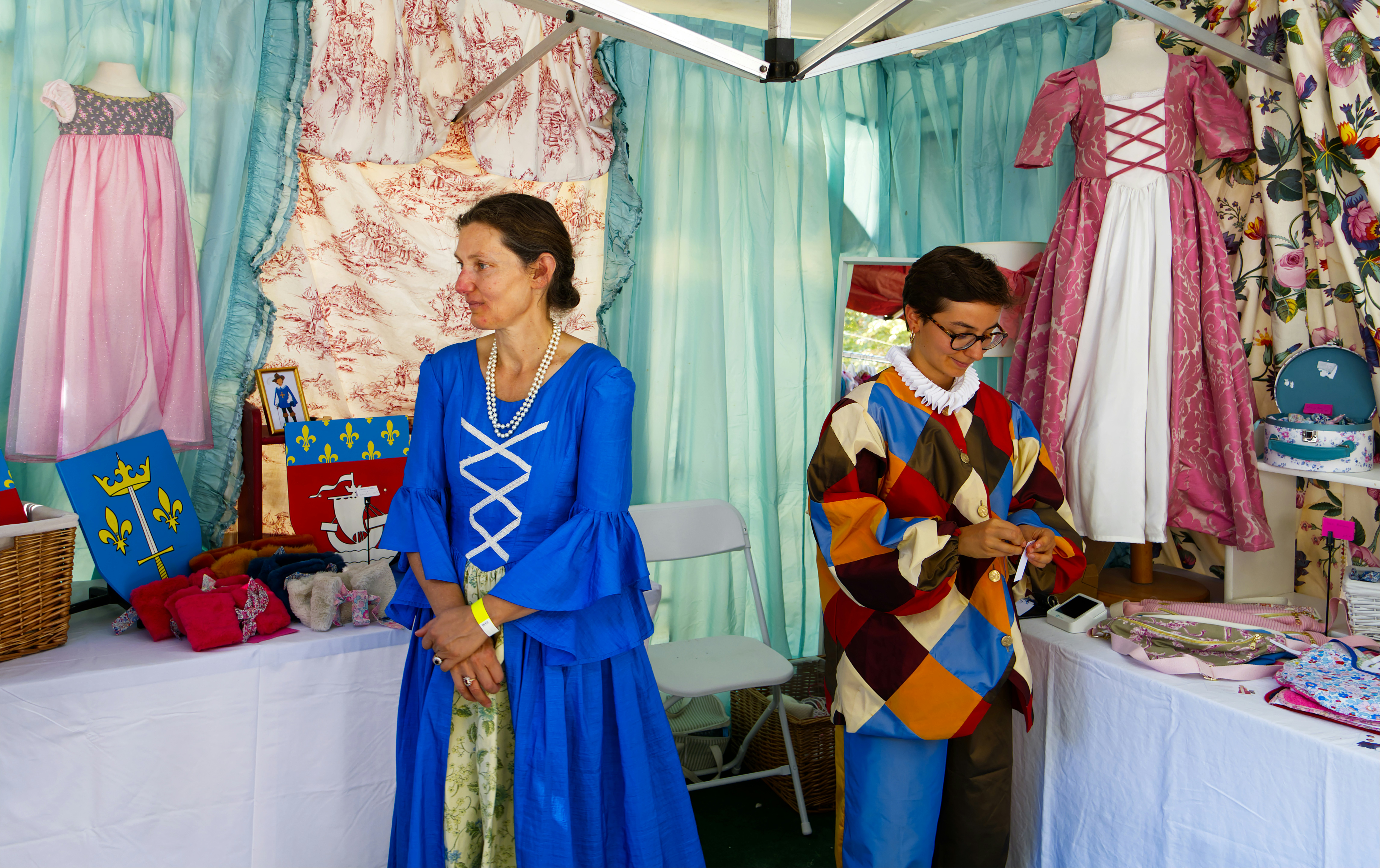 Blue Dress at the Costume Booth: A Moment of Medieval Charm