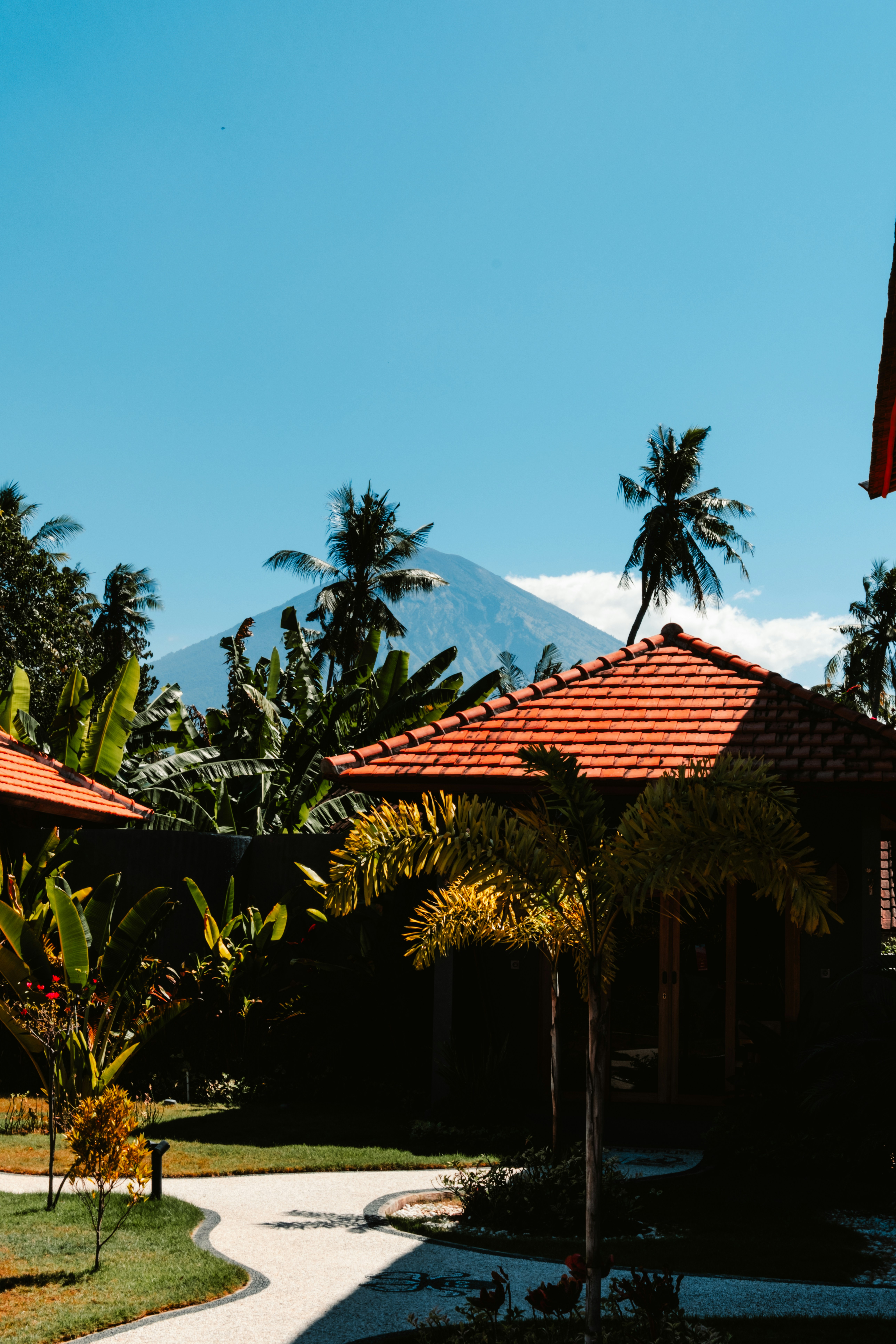 Tropical Villa Vista: A Cascading Shadow Under a Volcanic Peak