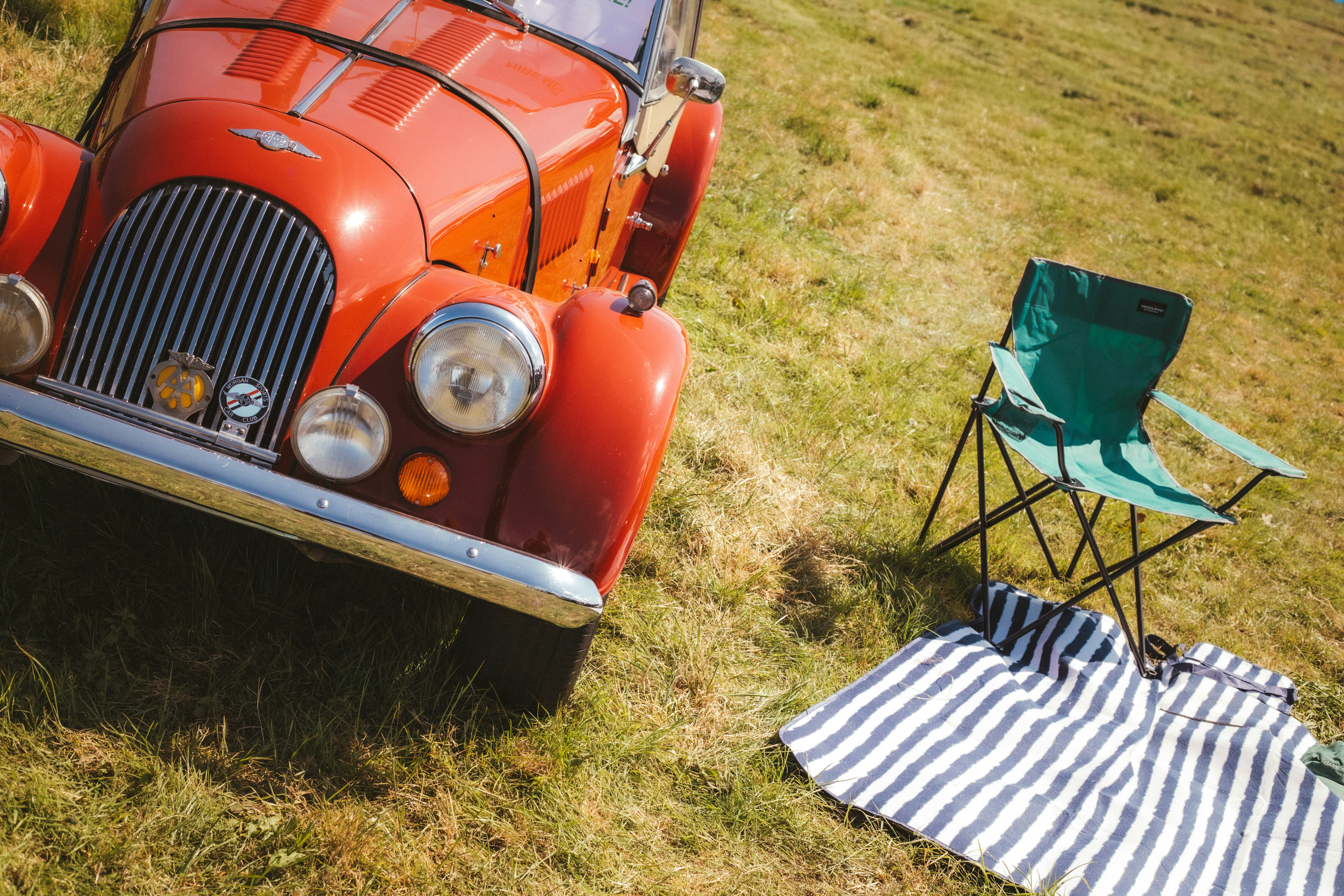 Red Vintage Chrome: A Rustic Car Rally by the Tented Lawn