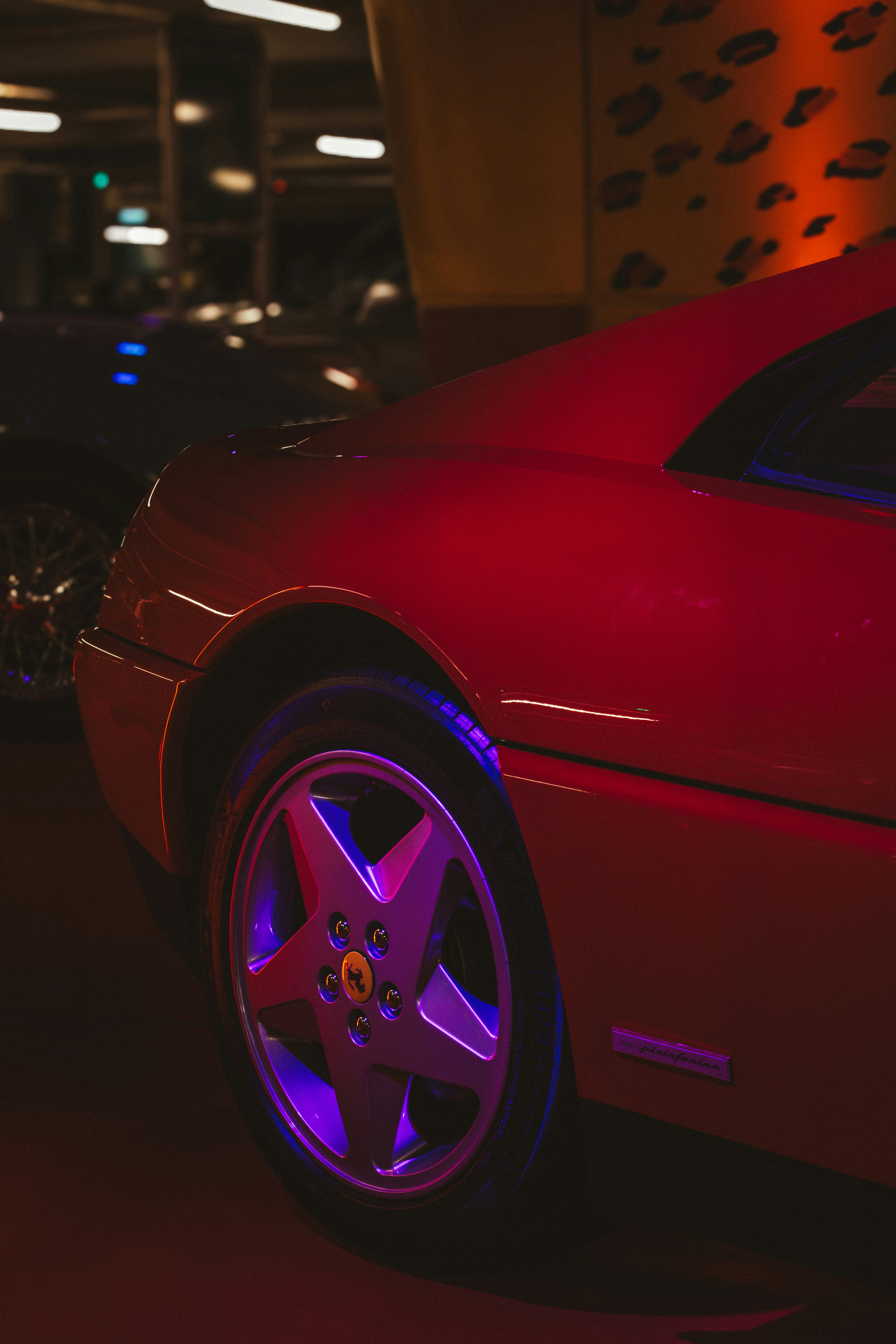 Red Curves and Neon Glass: A Night Car Portrait in Velvet Lighting