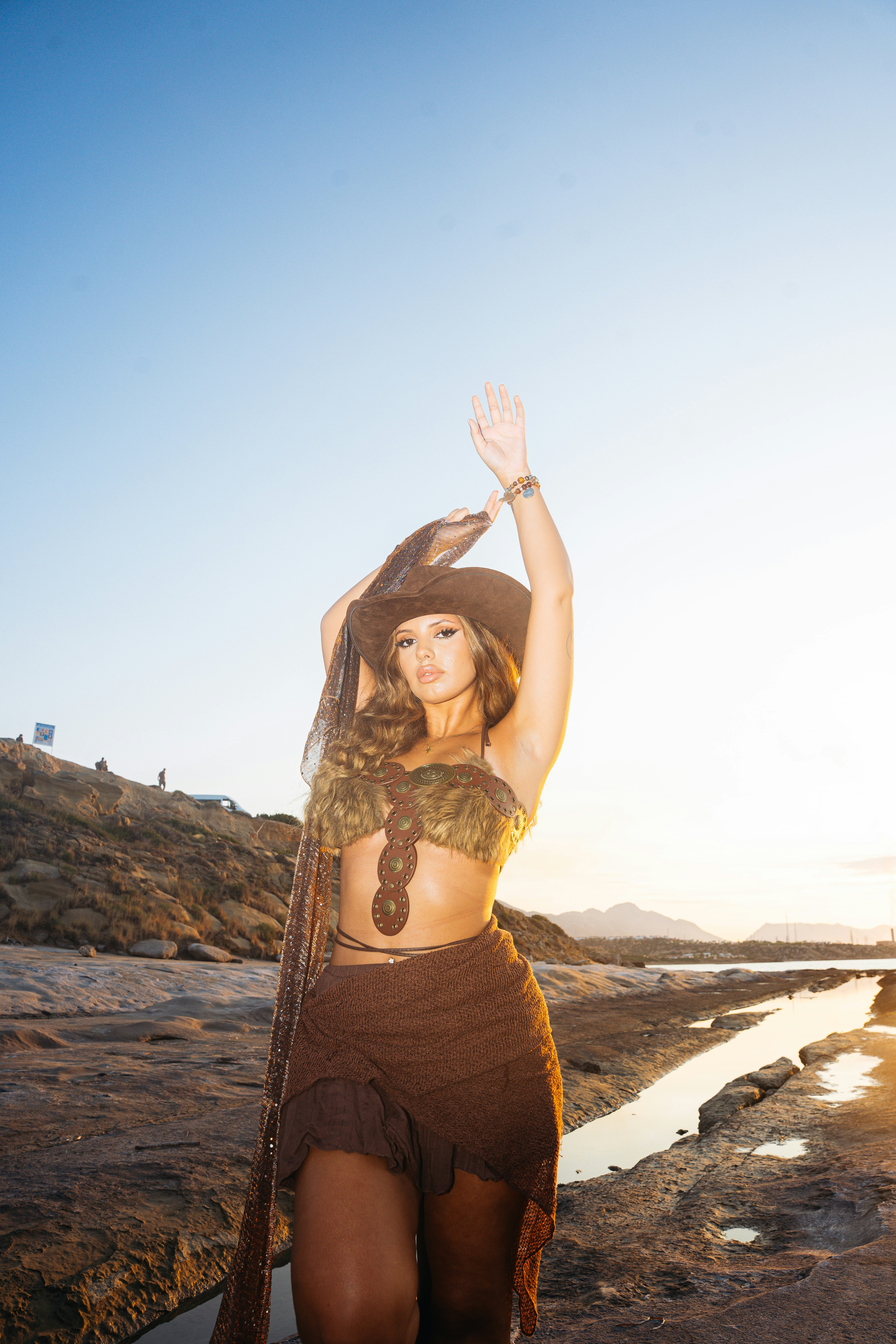 Desert Sunlit Dancer: A Free-Spirited Moment by the Shoreline