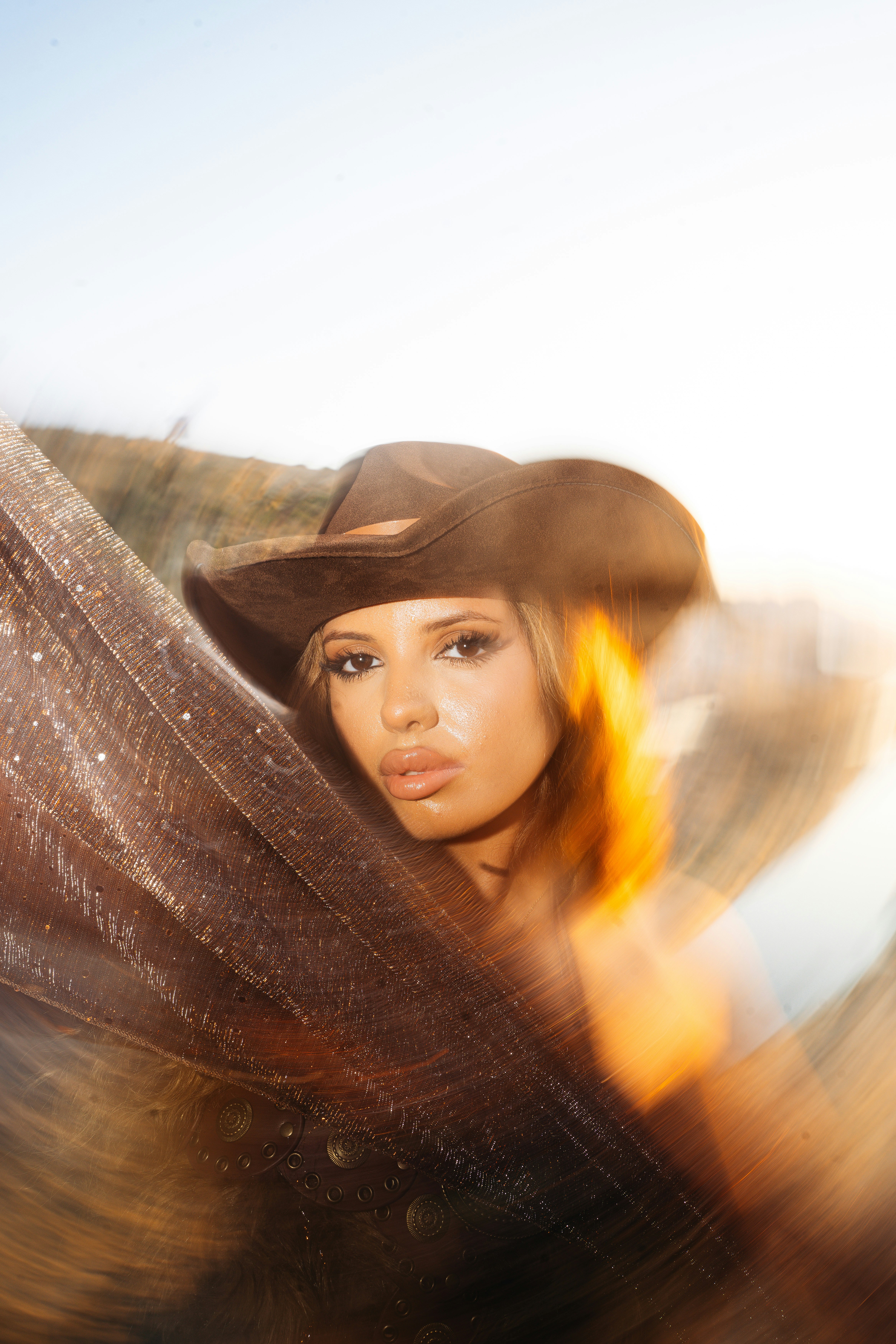 Dusty Coiffer: A Golden Hour Portrait in Motion