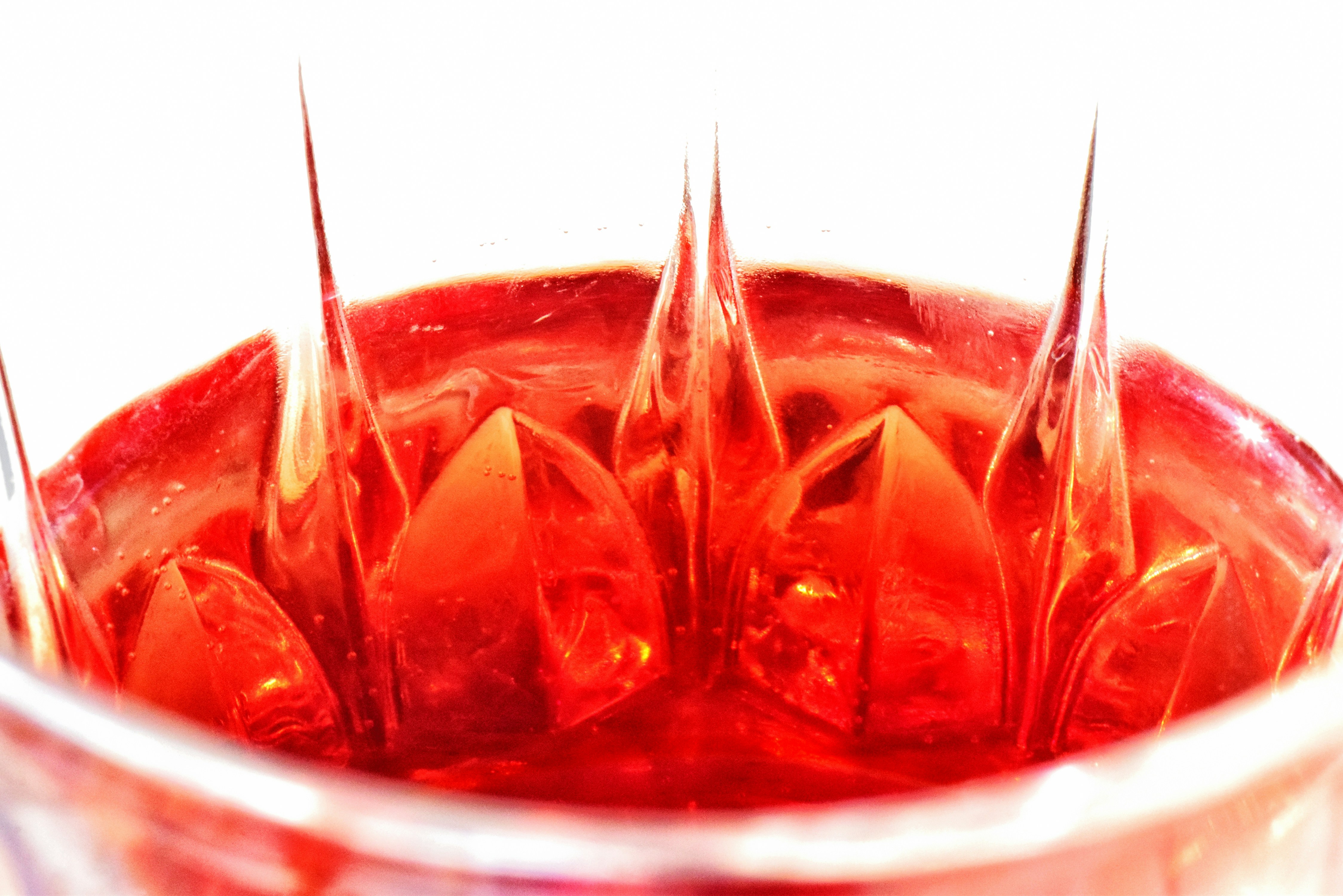 Crimson Crown: a close-up of ruby-like glass with sharp facets