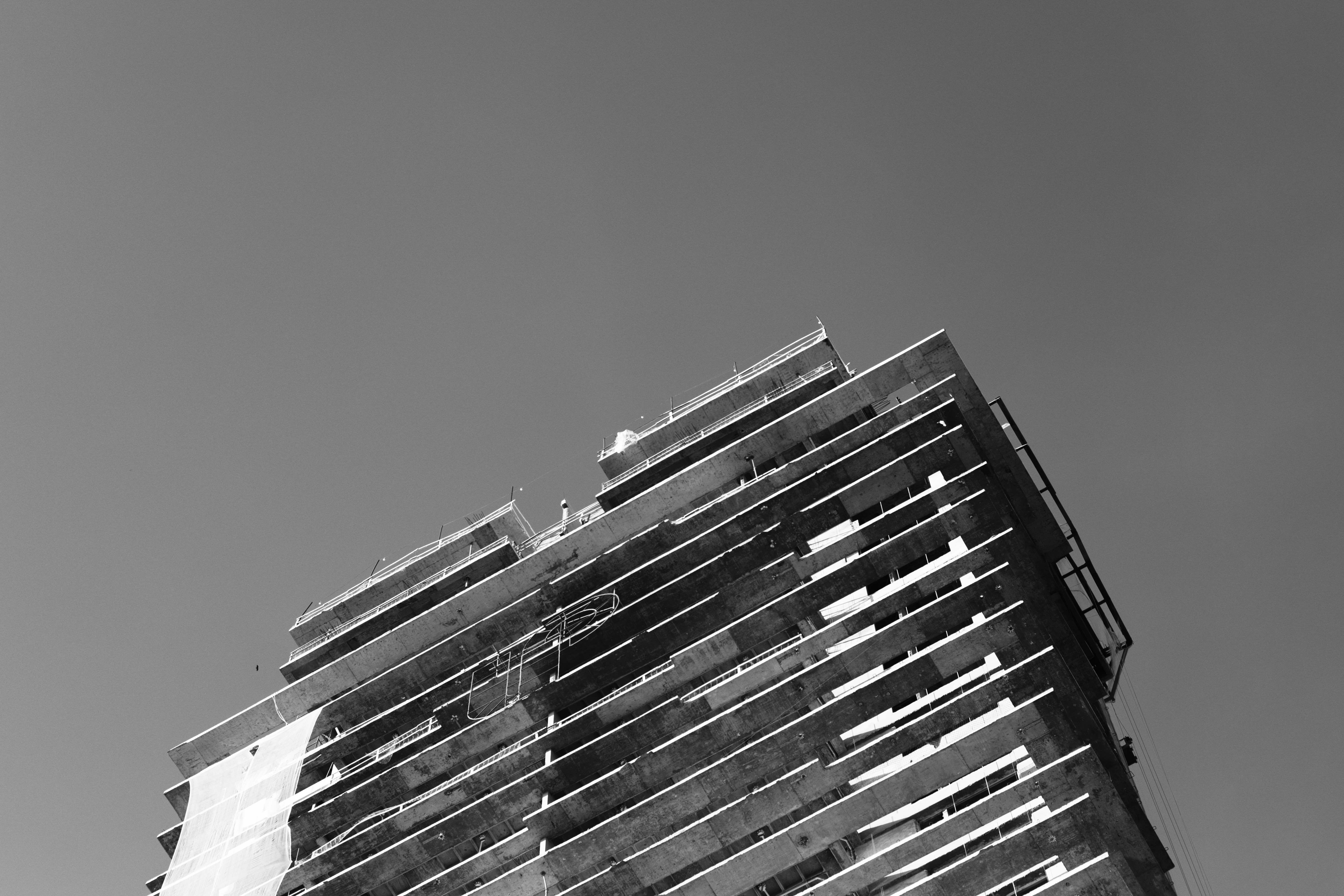 Concrete Skeleton: A Construction Facade Reaching Toward the Sky