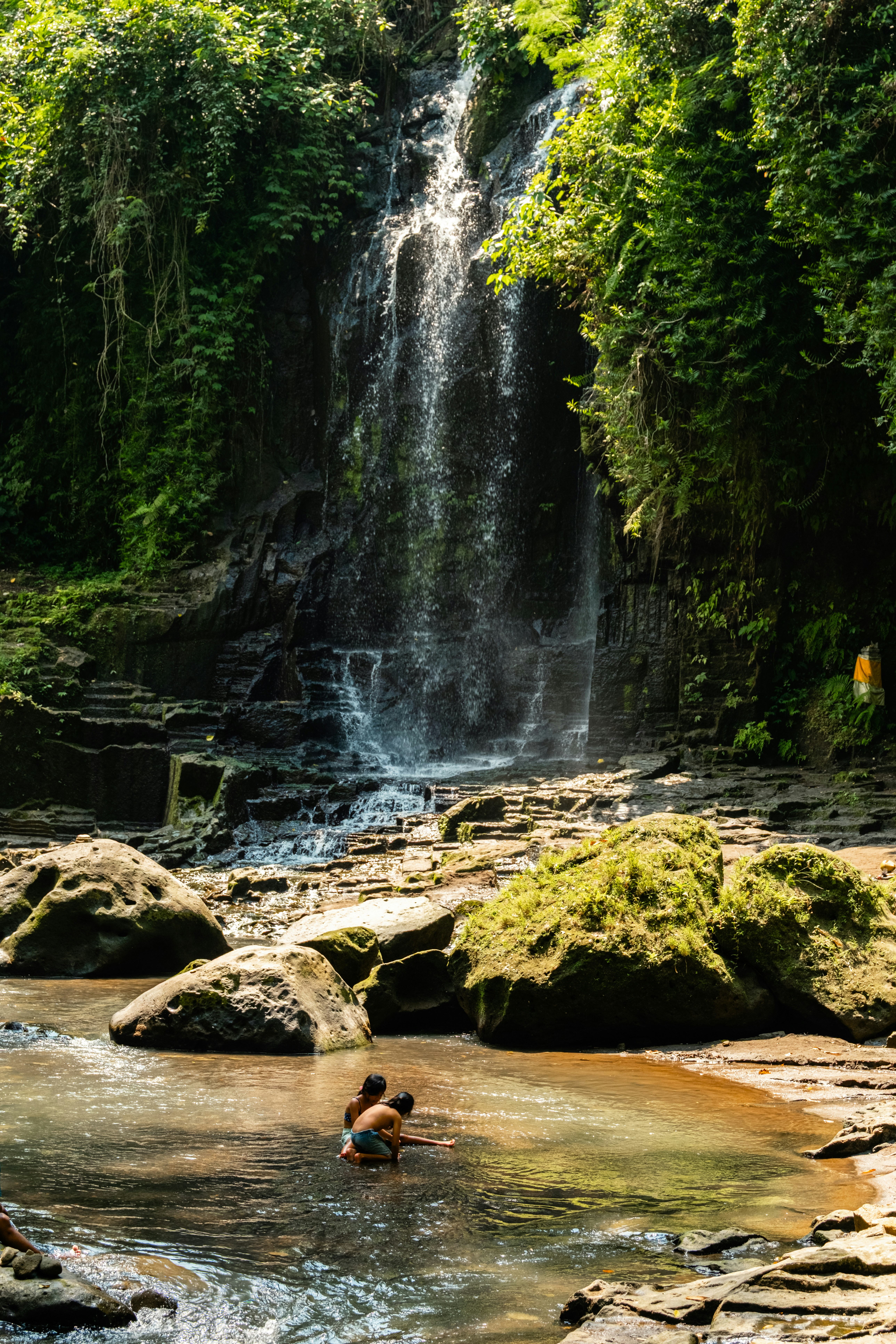 Dappled Light at the Falls: A Quiet Moment in the Pool