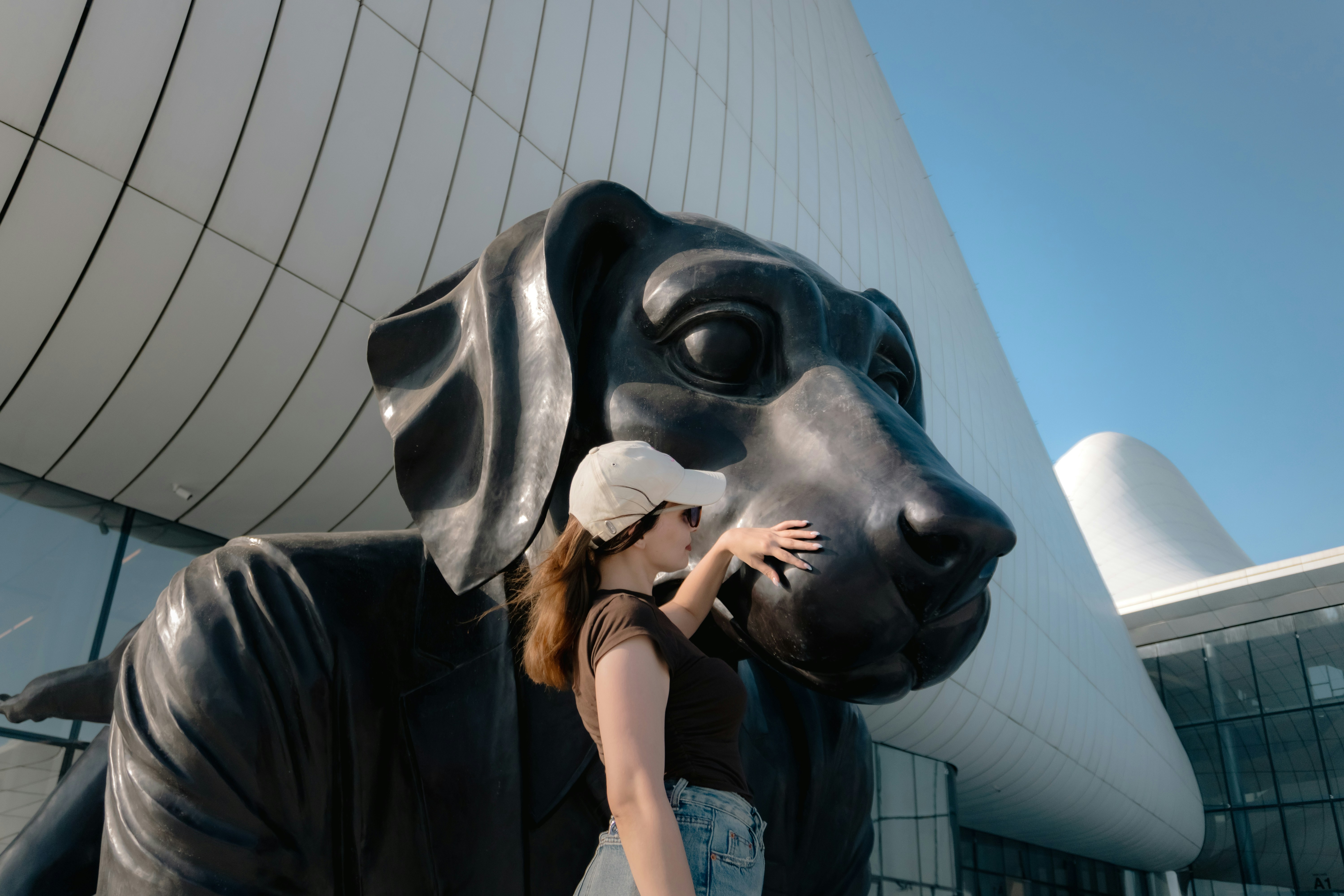 Statue Dog and Companion: A Moment at the Modern Sculpture