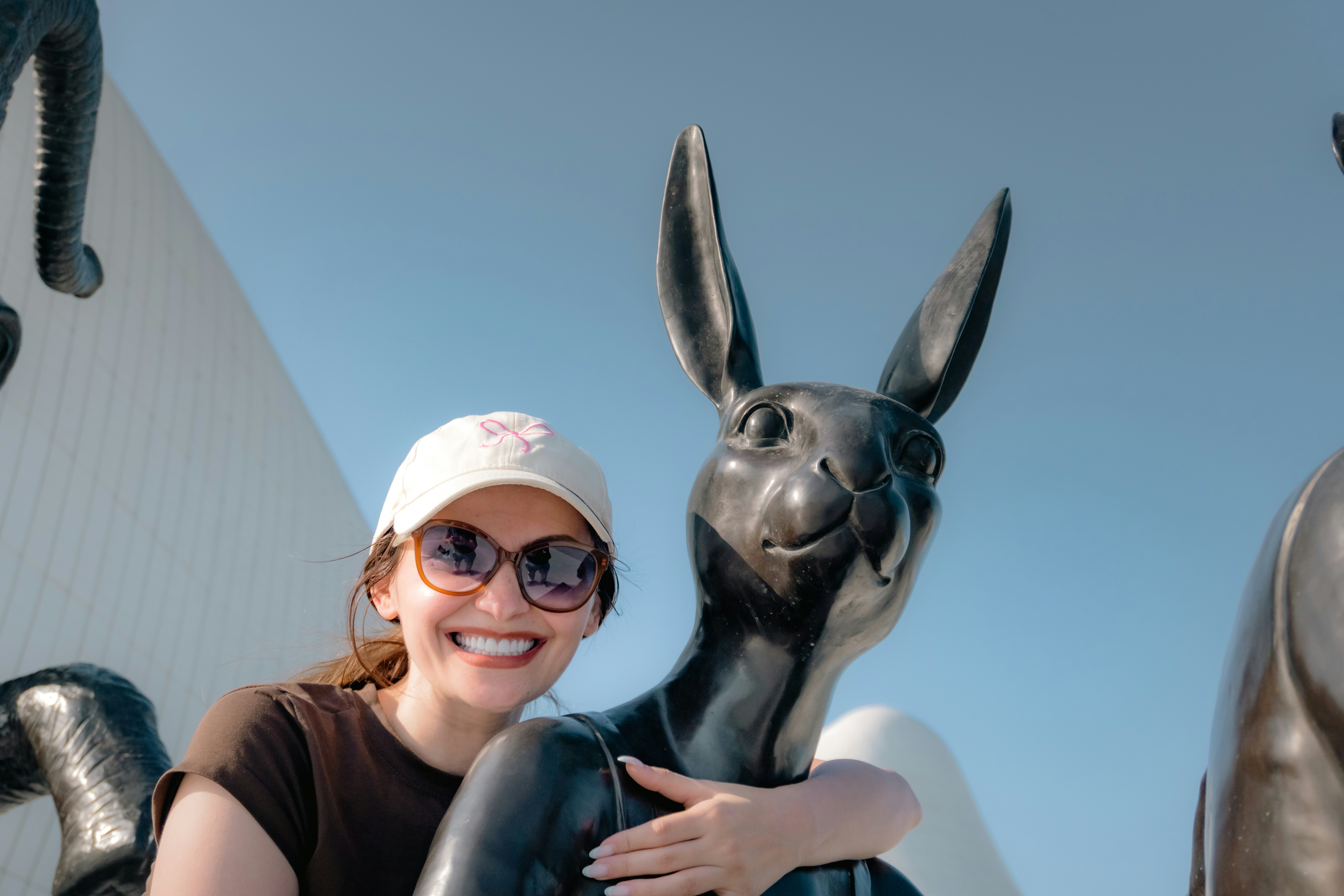 Smiling Moment with a Life-Size Bunny Companion