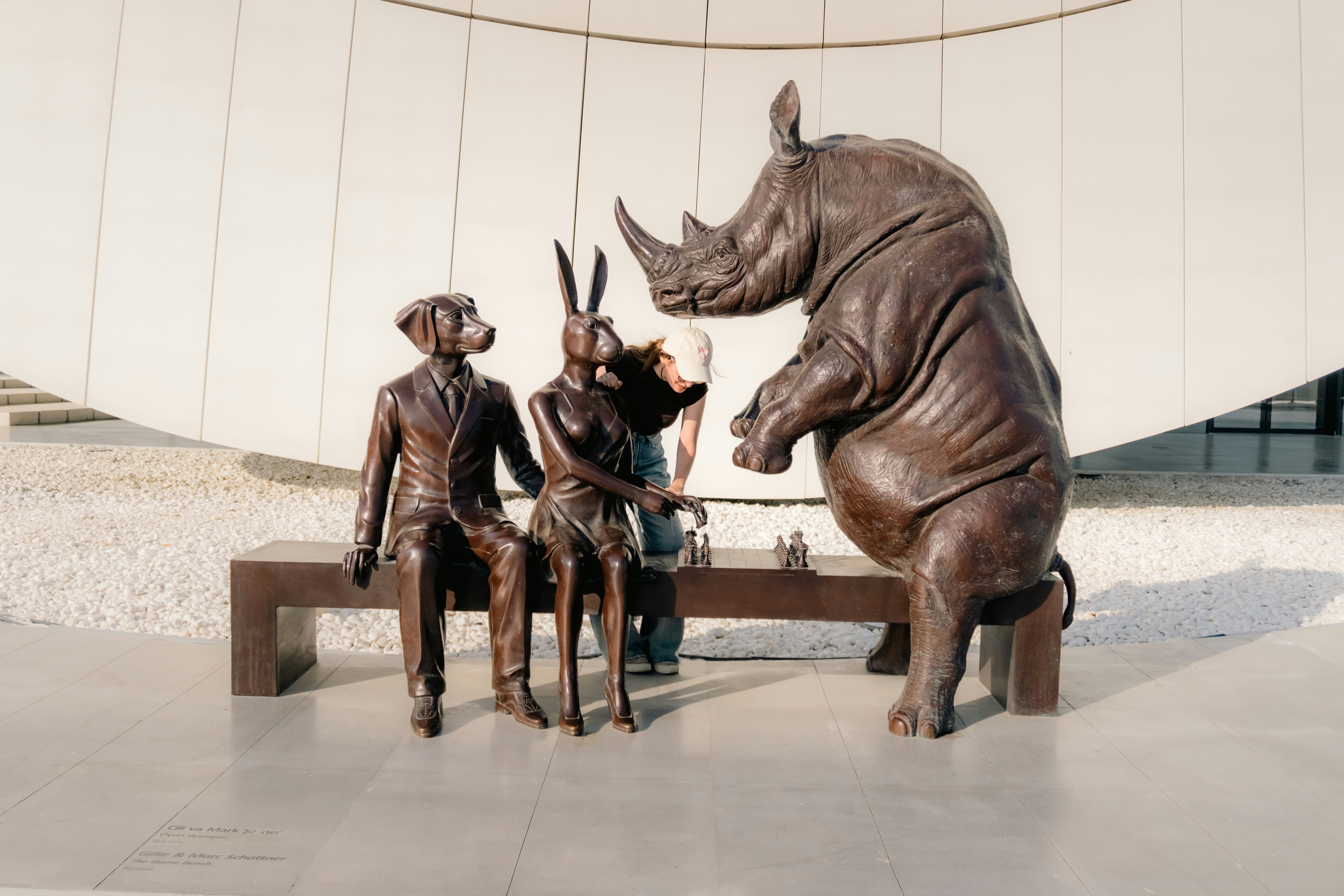 Bronze Figures and a Rhino: A Quiet Park Moment