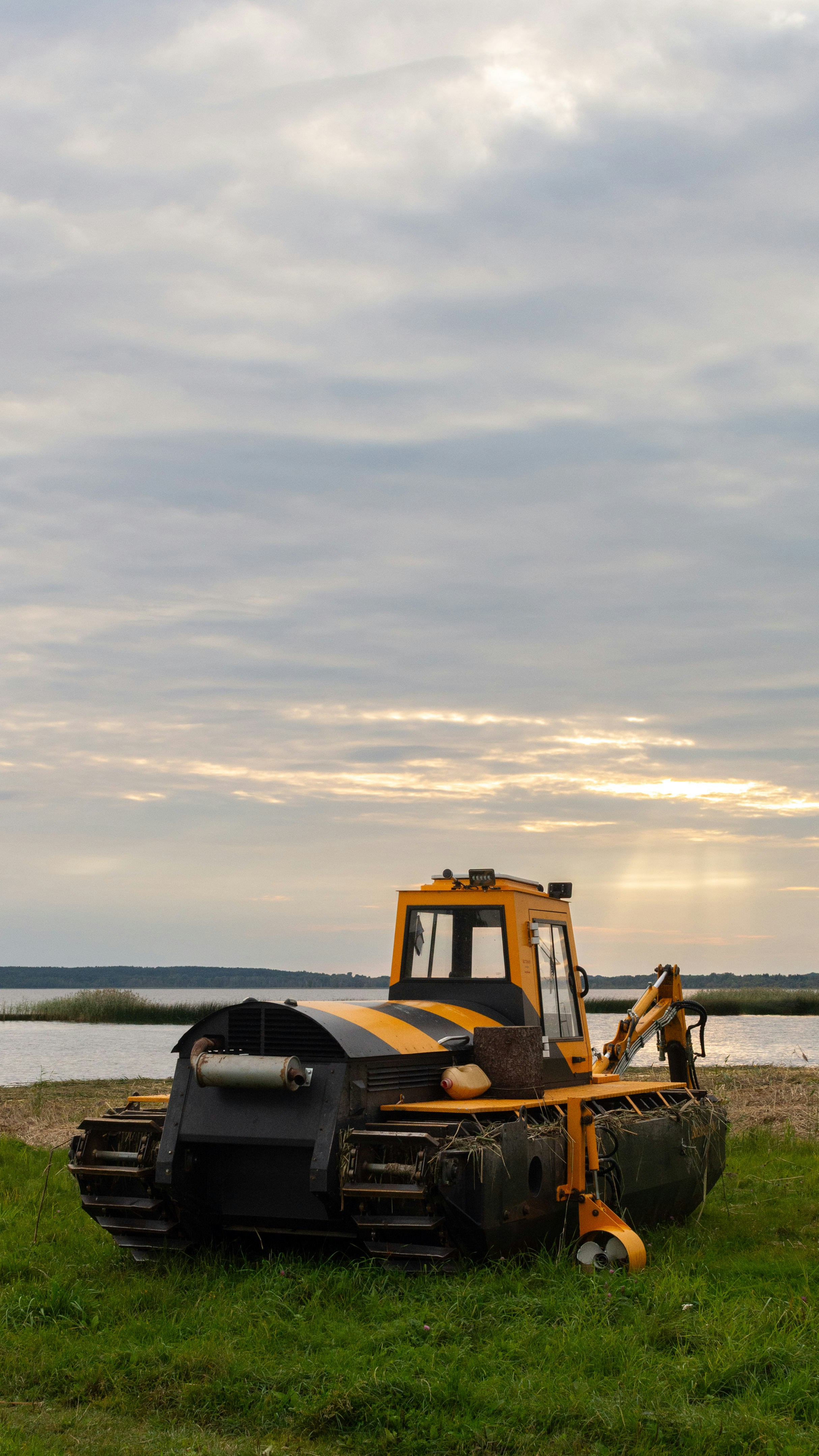 Yellow Tug on the Riverside Plain at Dusk