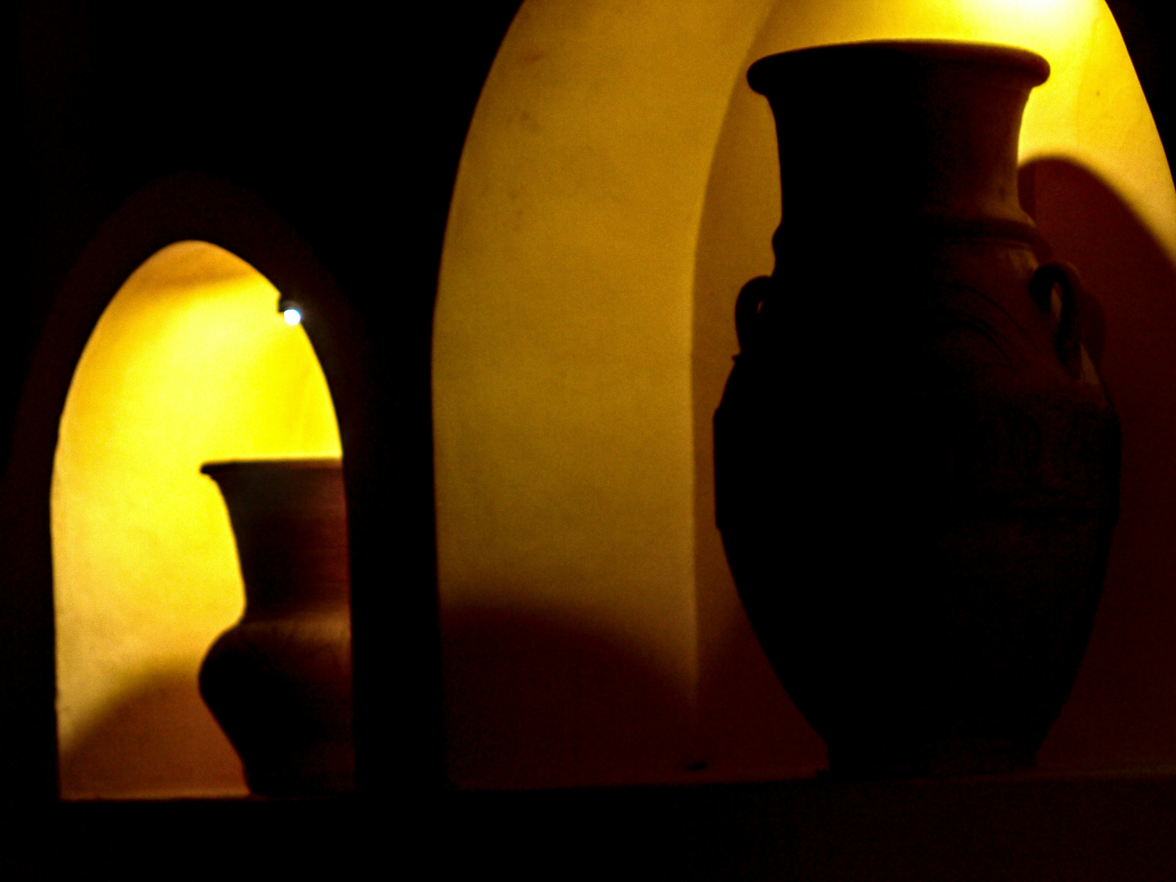 Shadowed Vessels in Warm Gallery Light