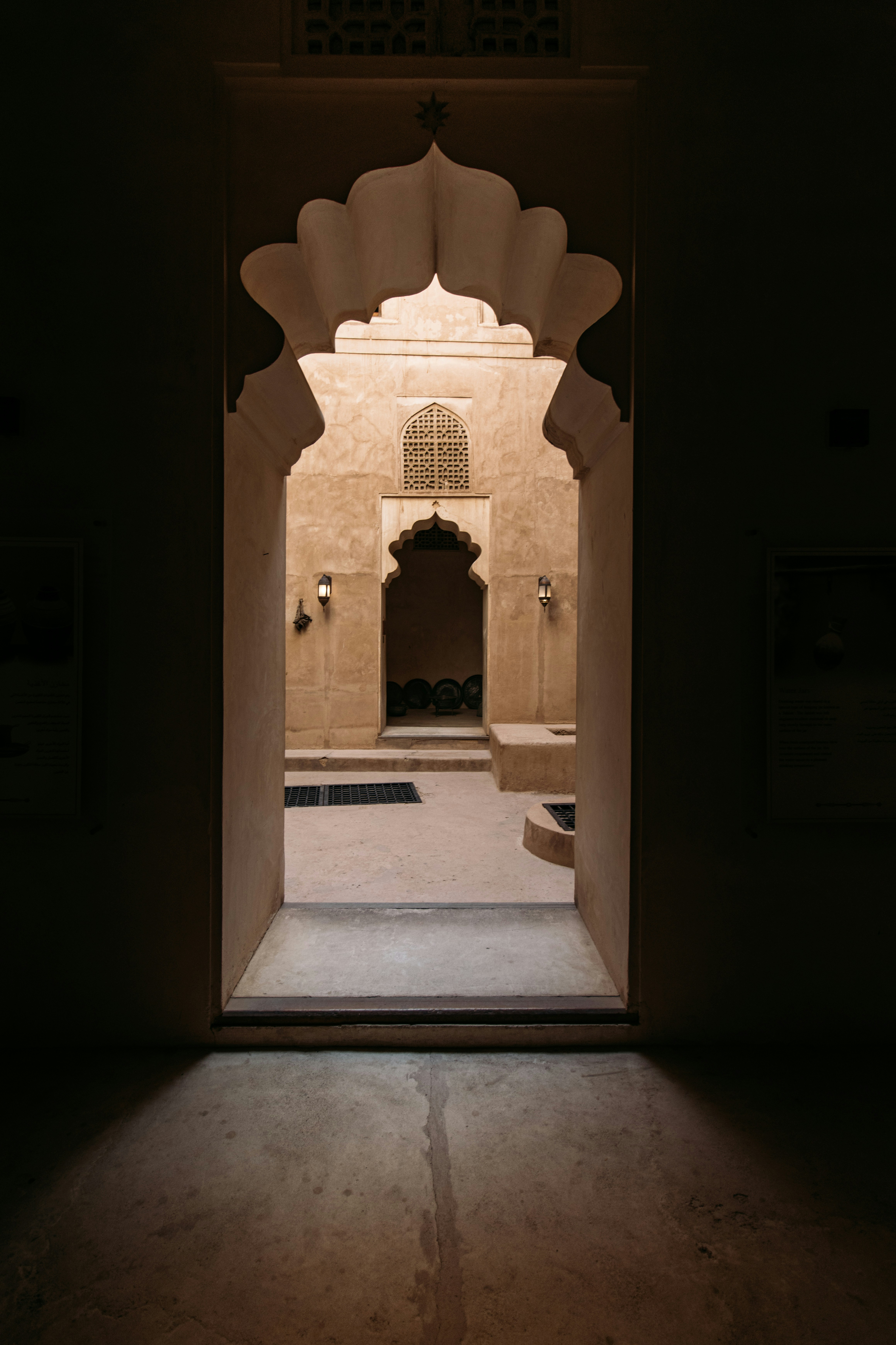 Lighted Archway: Quiet Corridor to a Courtyard