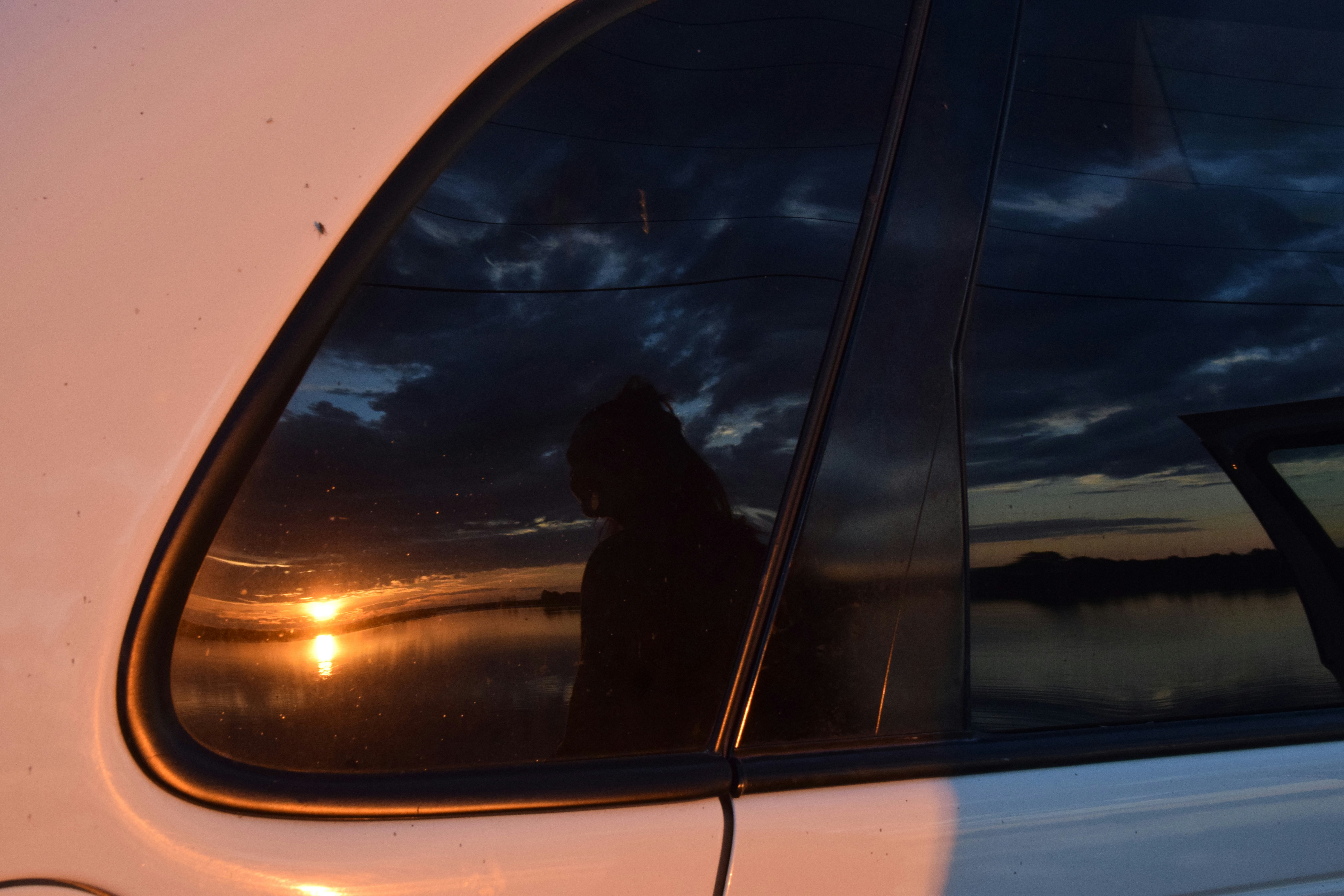 Sunlit Sunset in a Car Window