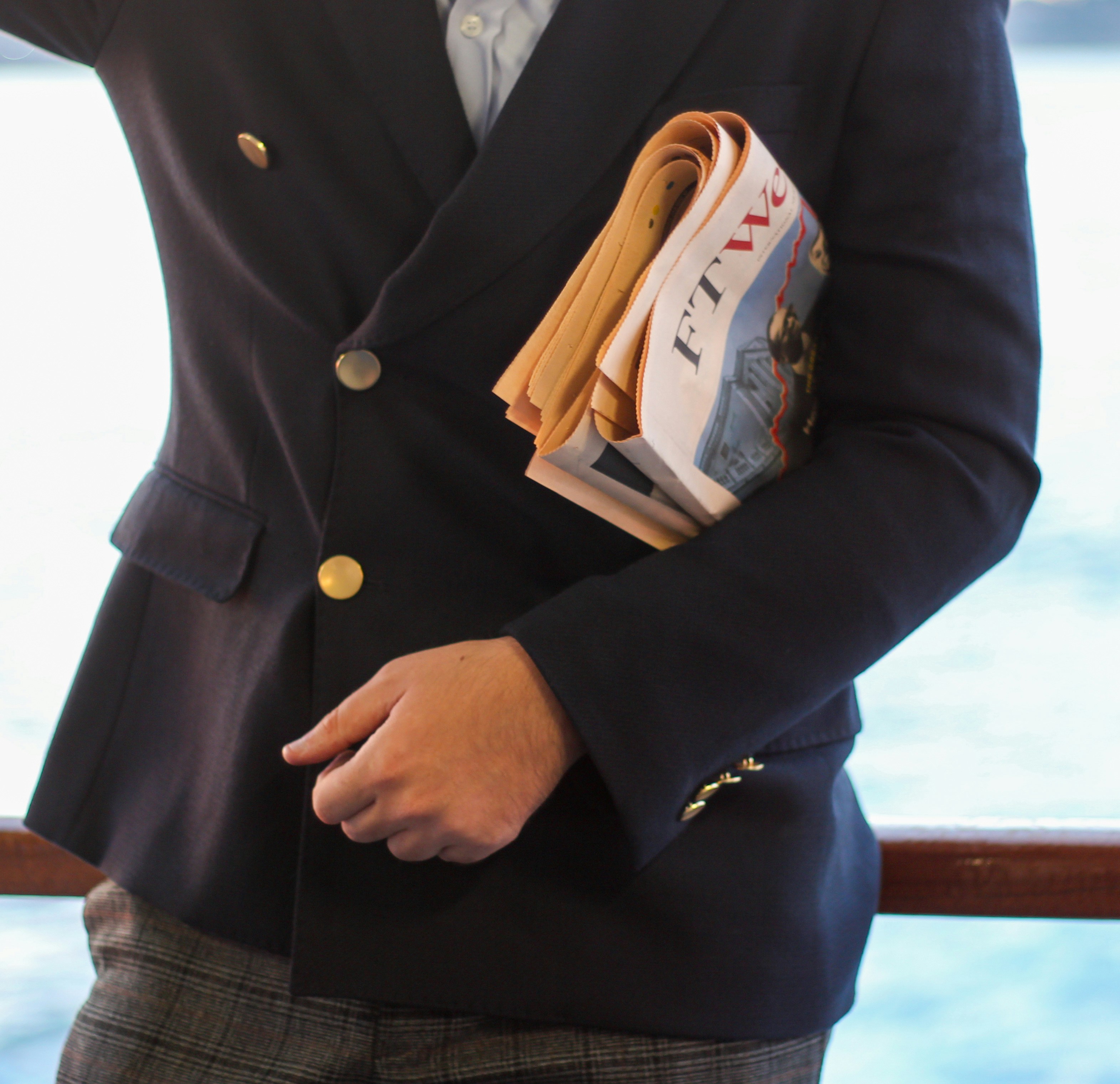 Pocket Newspaper: A Gentleman’s Archive in a Dark Blazer