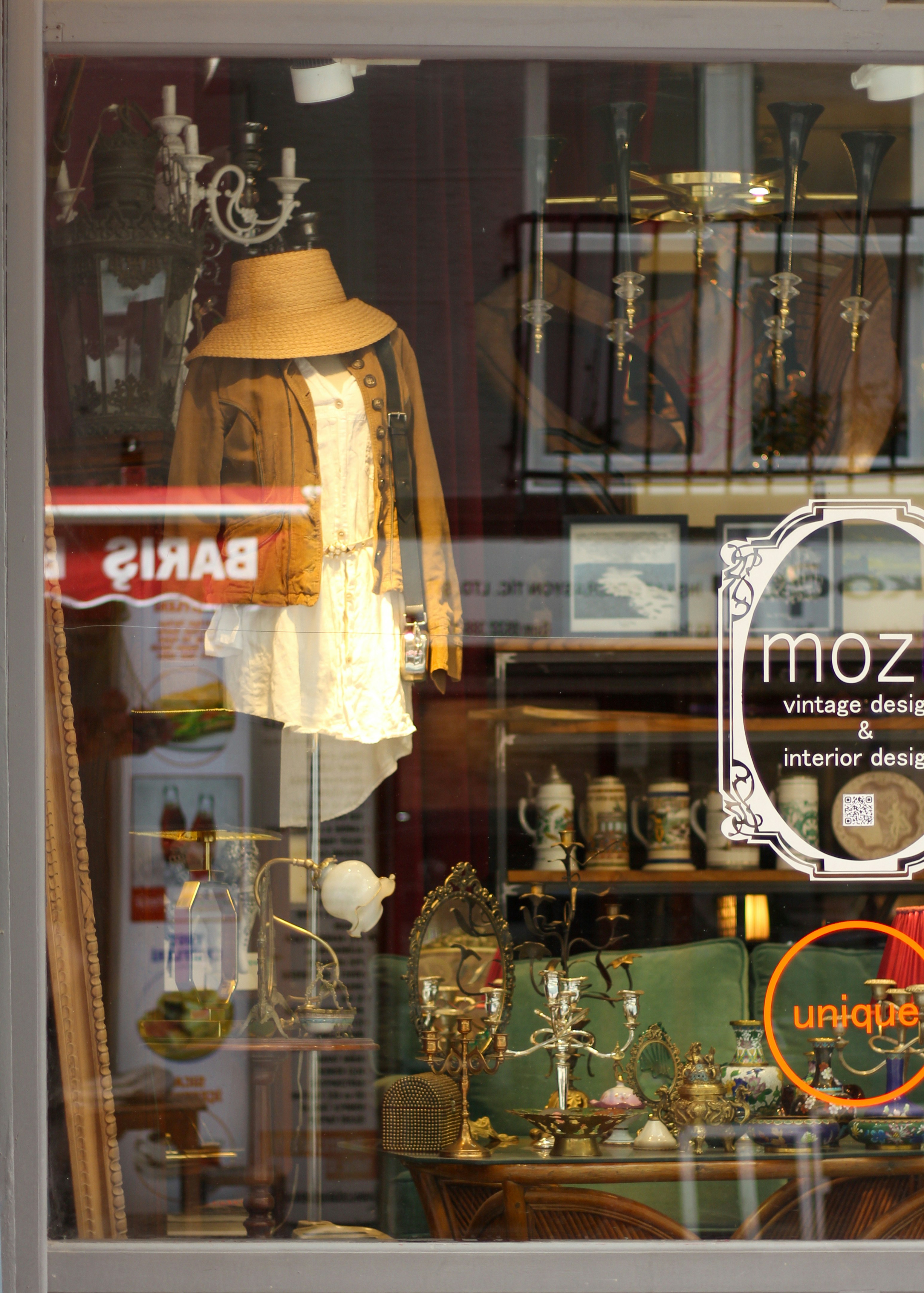 Vintage Echoes in a Shop Window: A Bursting Array of Brass and Lace
