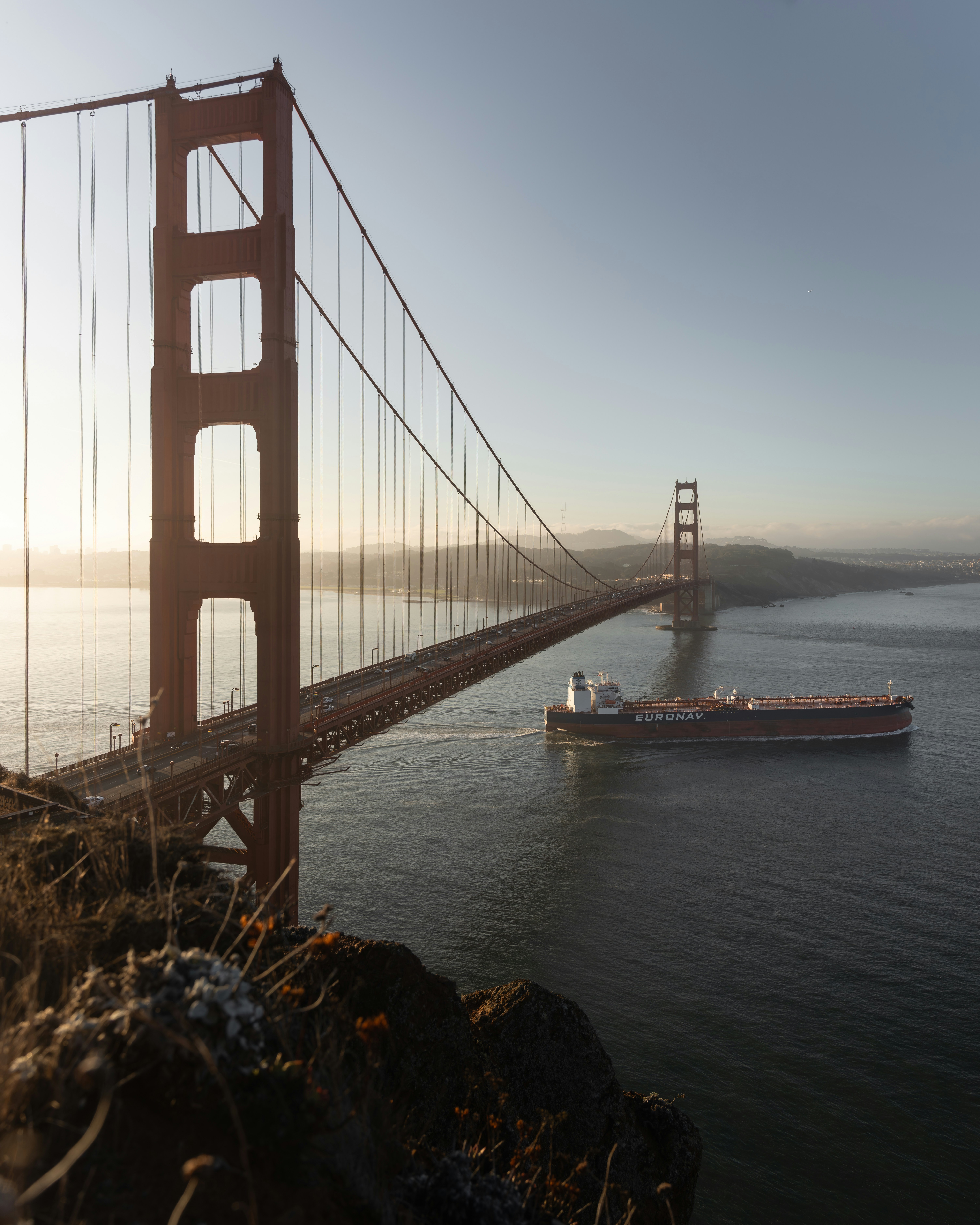 Golden Gate at Dusk: A Ship Passes Beneath the Quiet Span