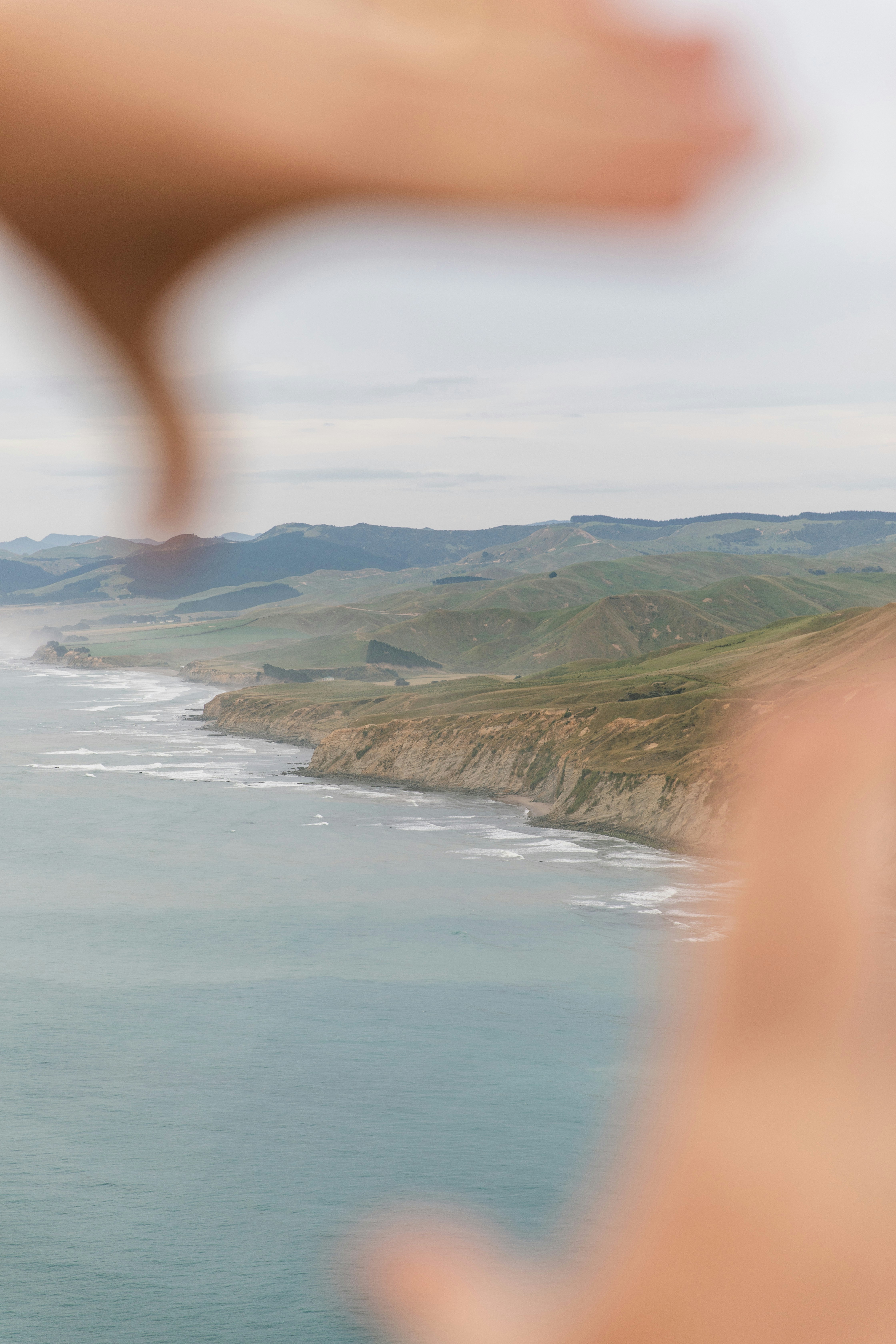 Coastal Vista Framed by a Blur: A Landscape Through a Soft Window
