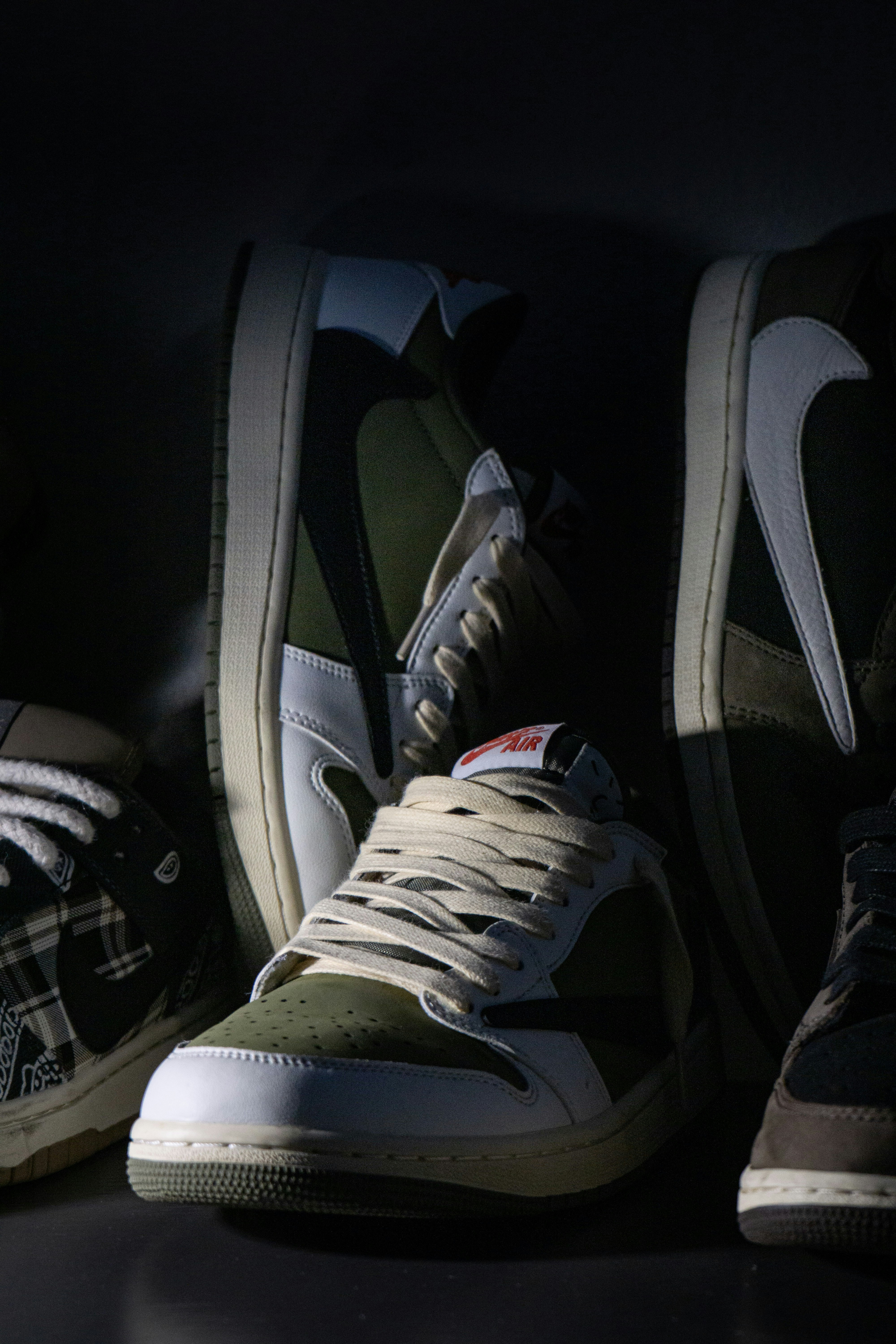 Midnight Sneaker Stack: A Quiet Display of Urban Footwear