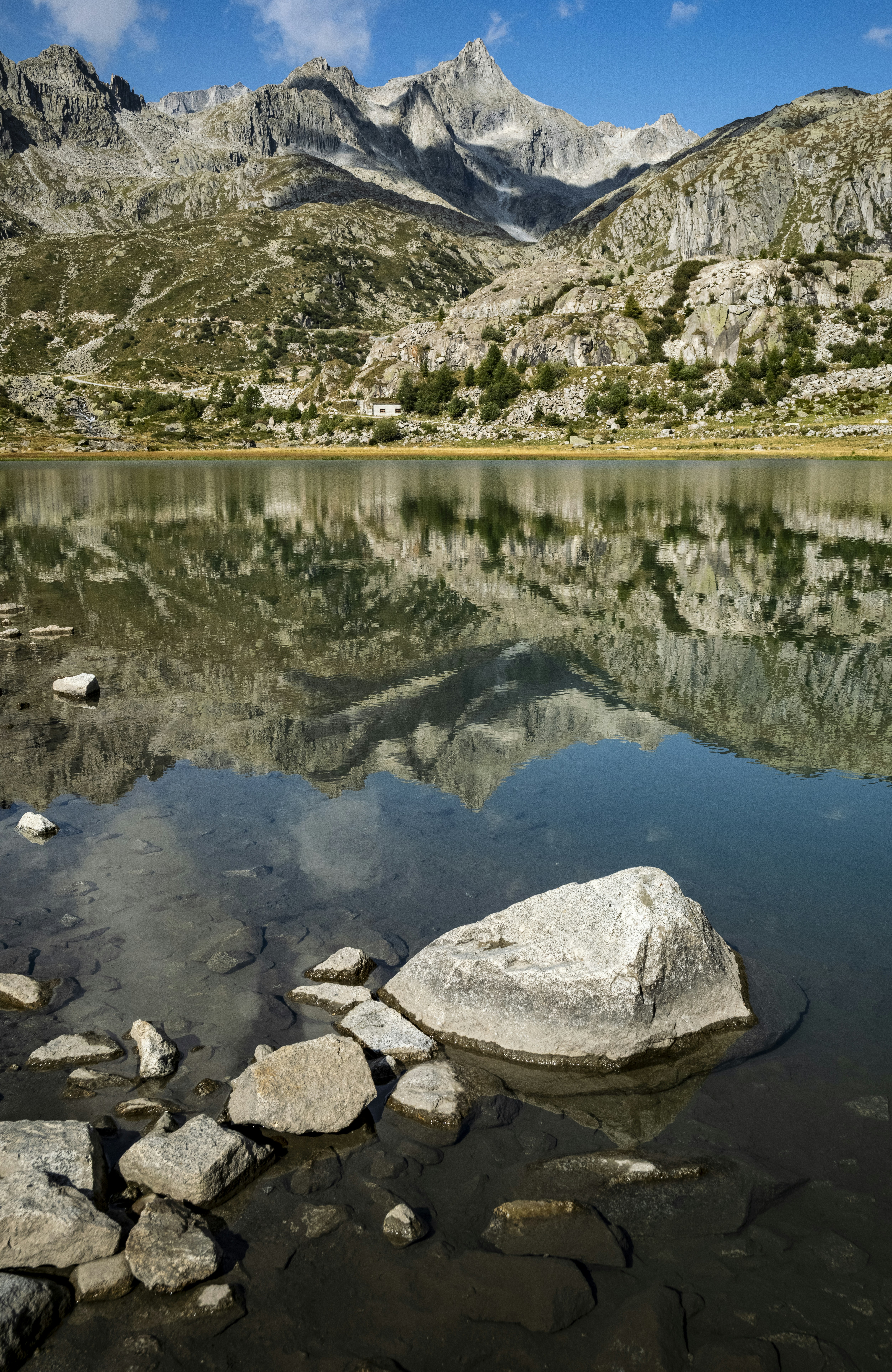 Mirror of Stone and Sky: Alpine Lake Reflections