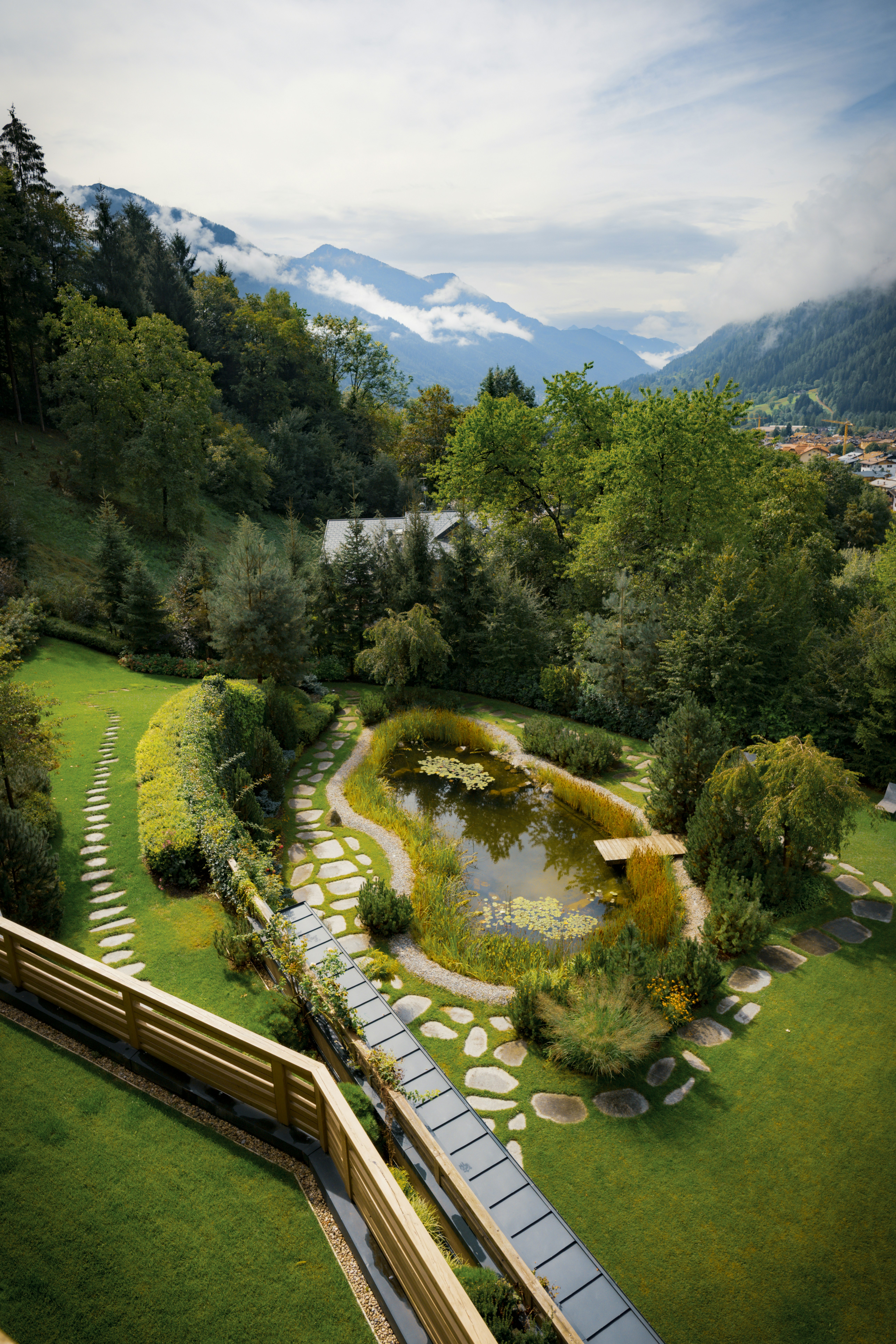 Terraced Garden Overlooking Misty Alpine Valley