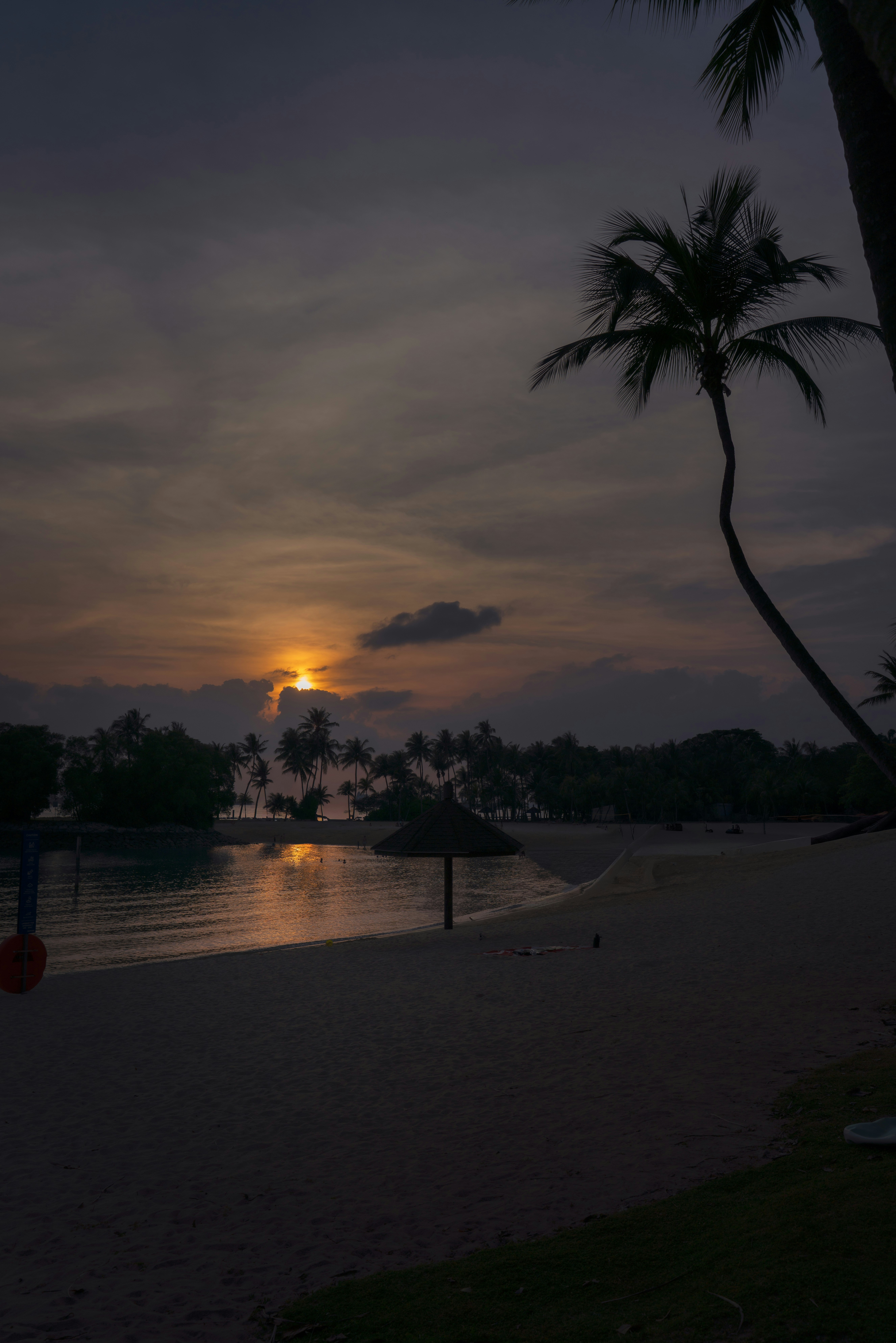 Sunset Silhouette Over Quiet Lagoon