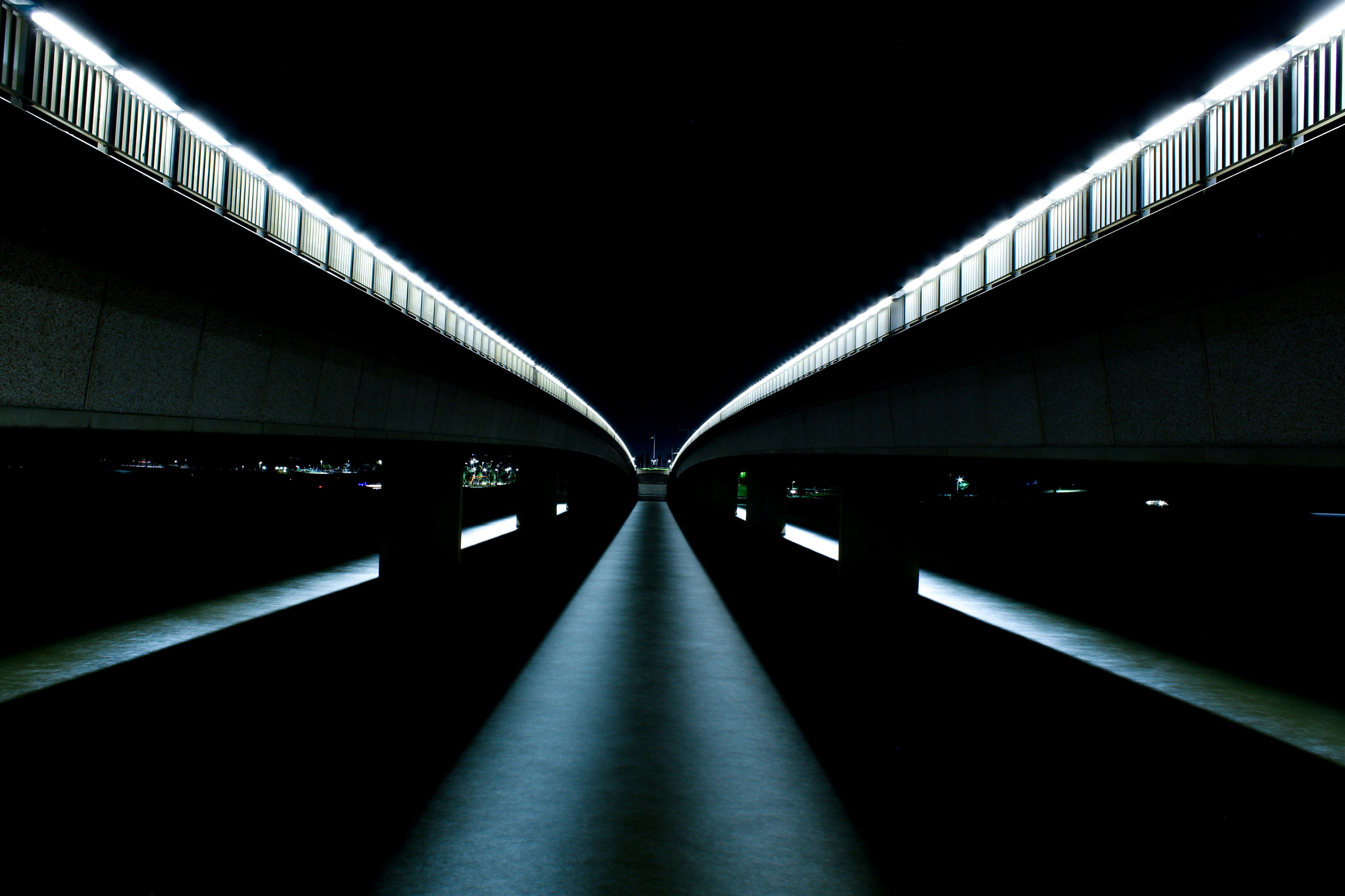 Converging Rails: A Quiet Descent into Darkness