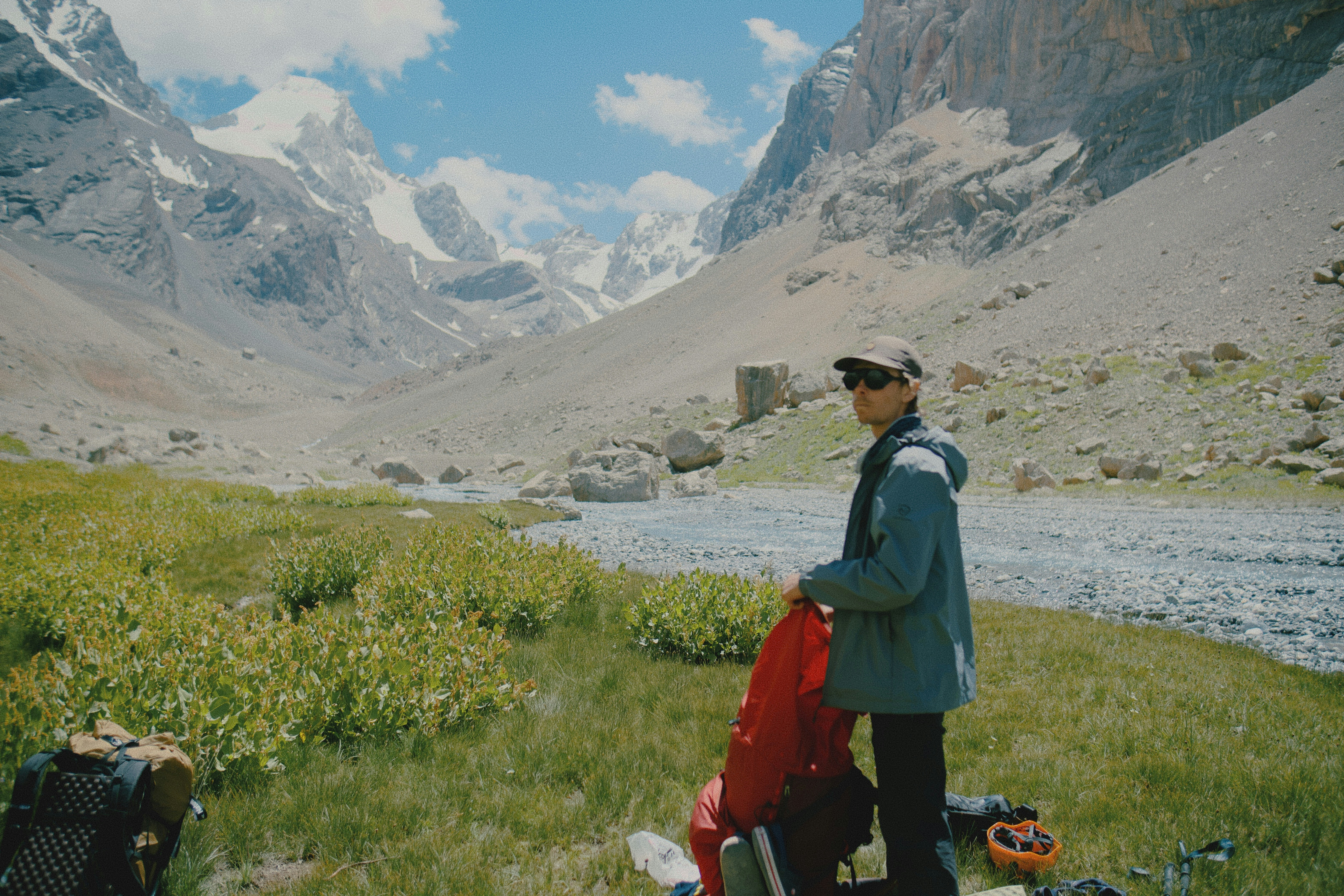 Alpine Trekker in a Valley of Ice and Stone