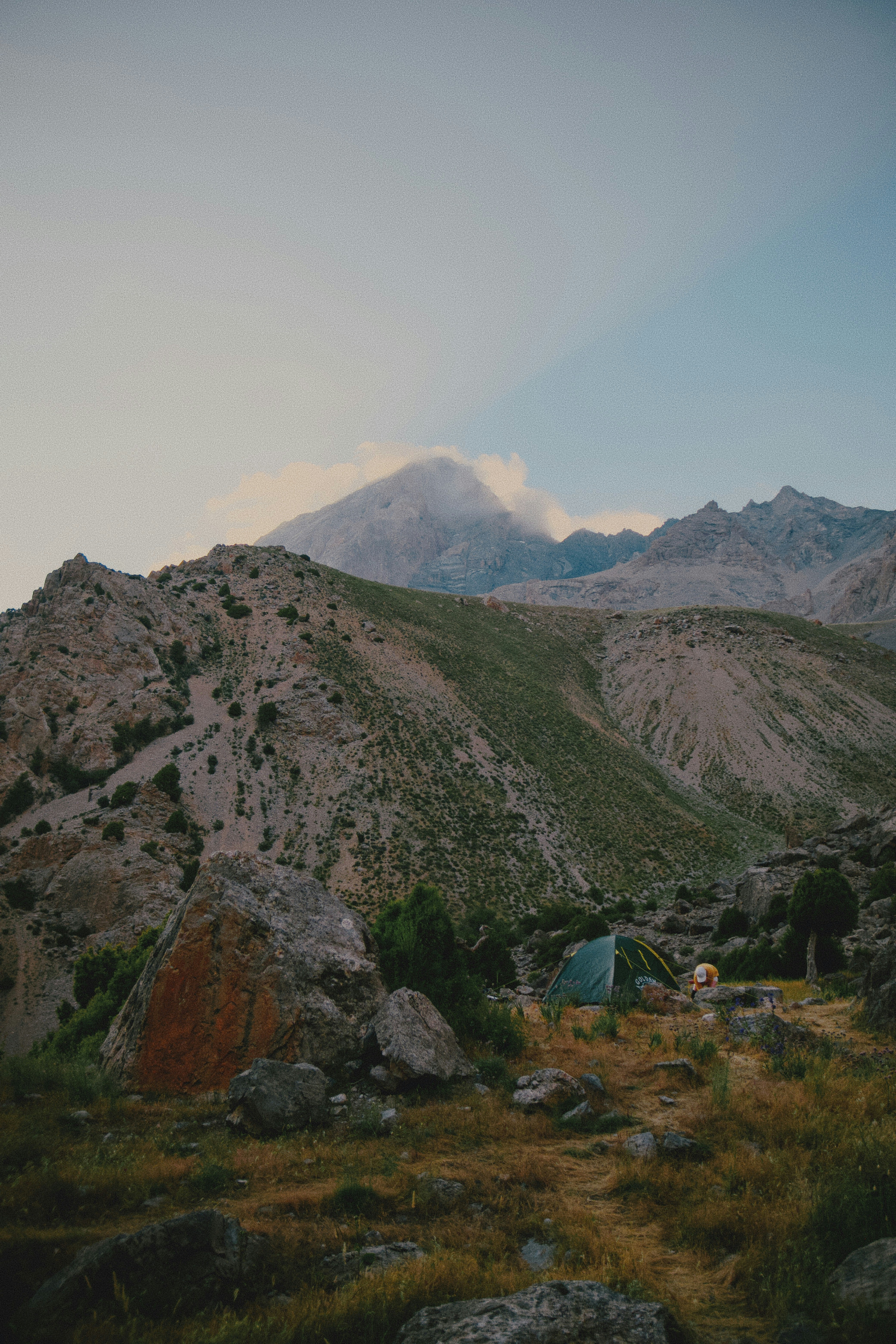 Tent Under a Crowned Ridge: Mountain Camp at Dusk